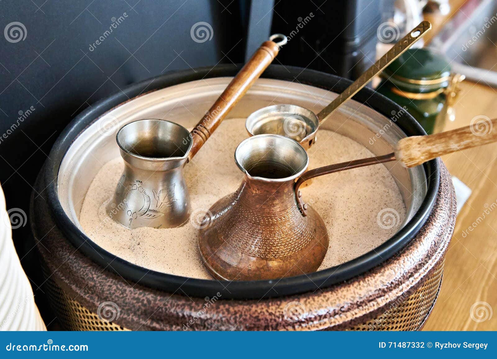Preparation Of Turkish Coffee In The Cezve In The Sand At Cafe Bar ...