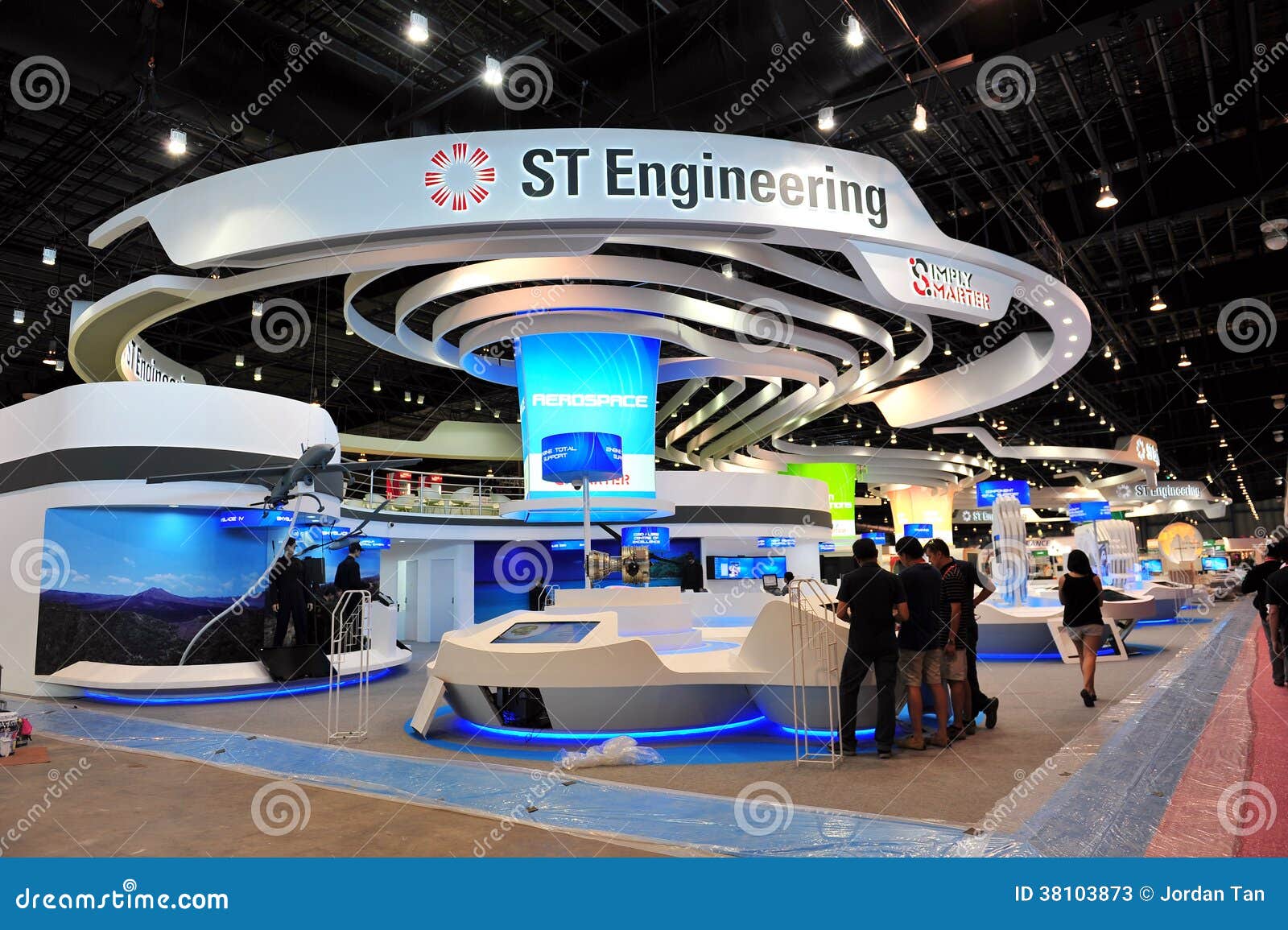 Preparation Underway at ST Engineering Booth at Singapore Airshow 2012 ...