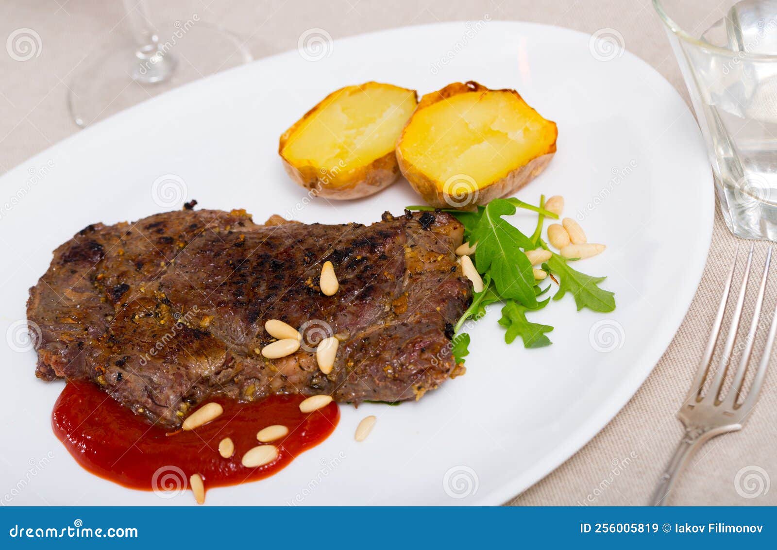 Prepared Beef Steak with Tomatoe Ketchup and Pine Nuts Stock Image ...