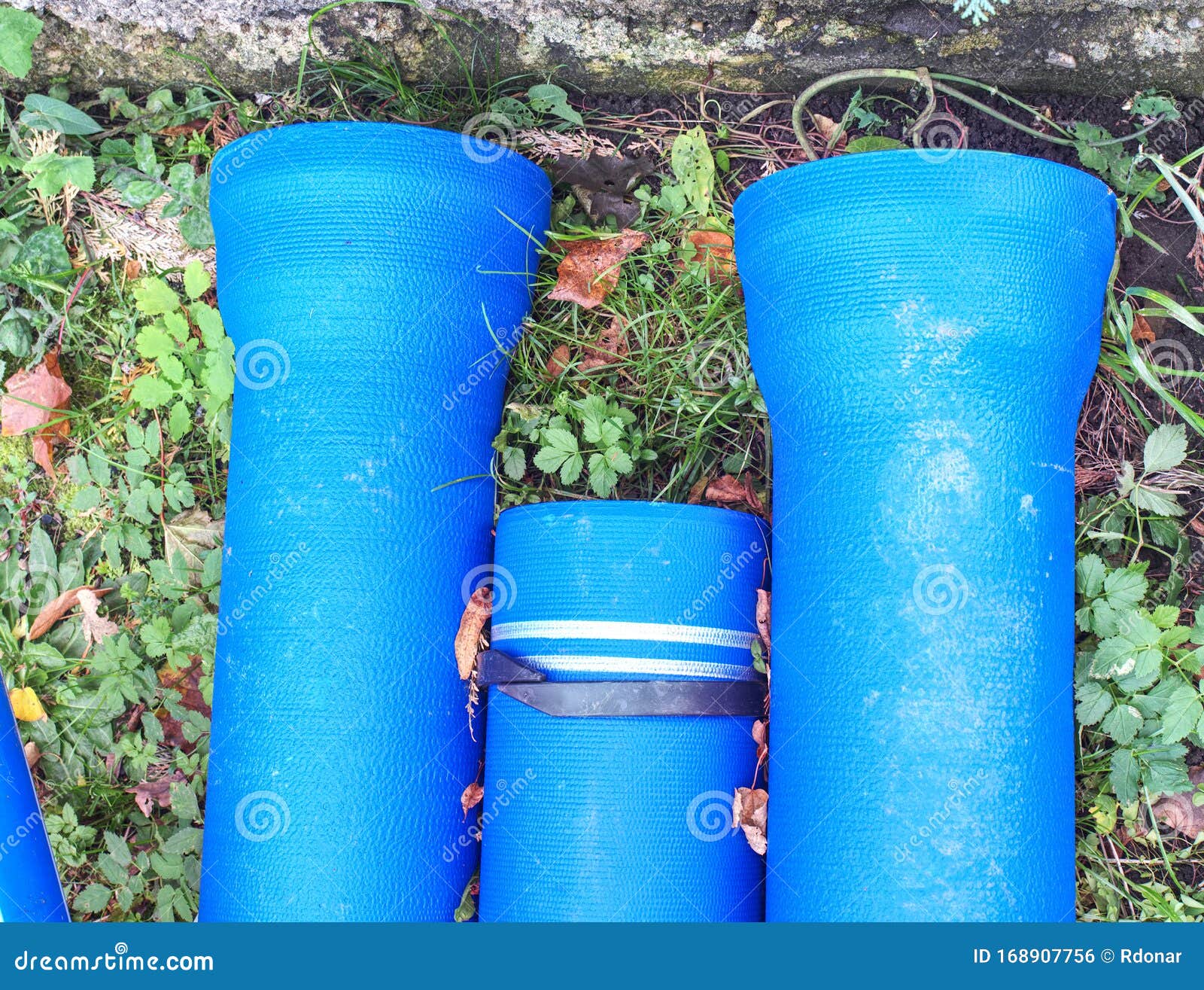 Plastic And Rubbery Rubbish Washed Up On A Stony Beach. Royalty-Free ...