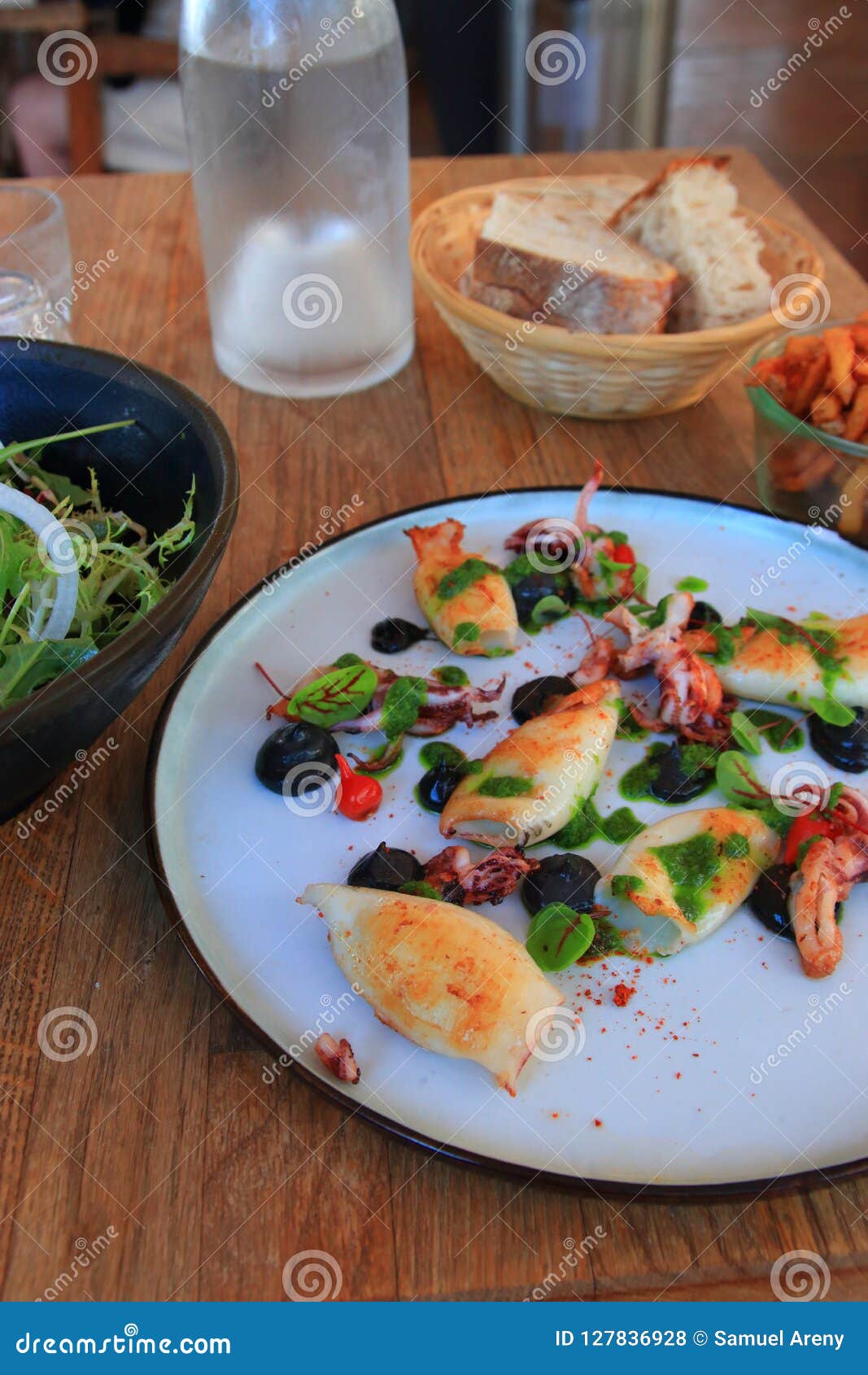 Prepared Plate of Cuttlefish and Squid on the Table of a Restaurant ...