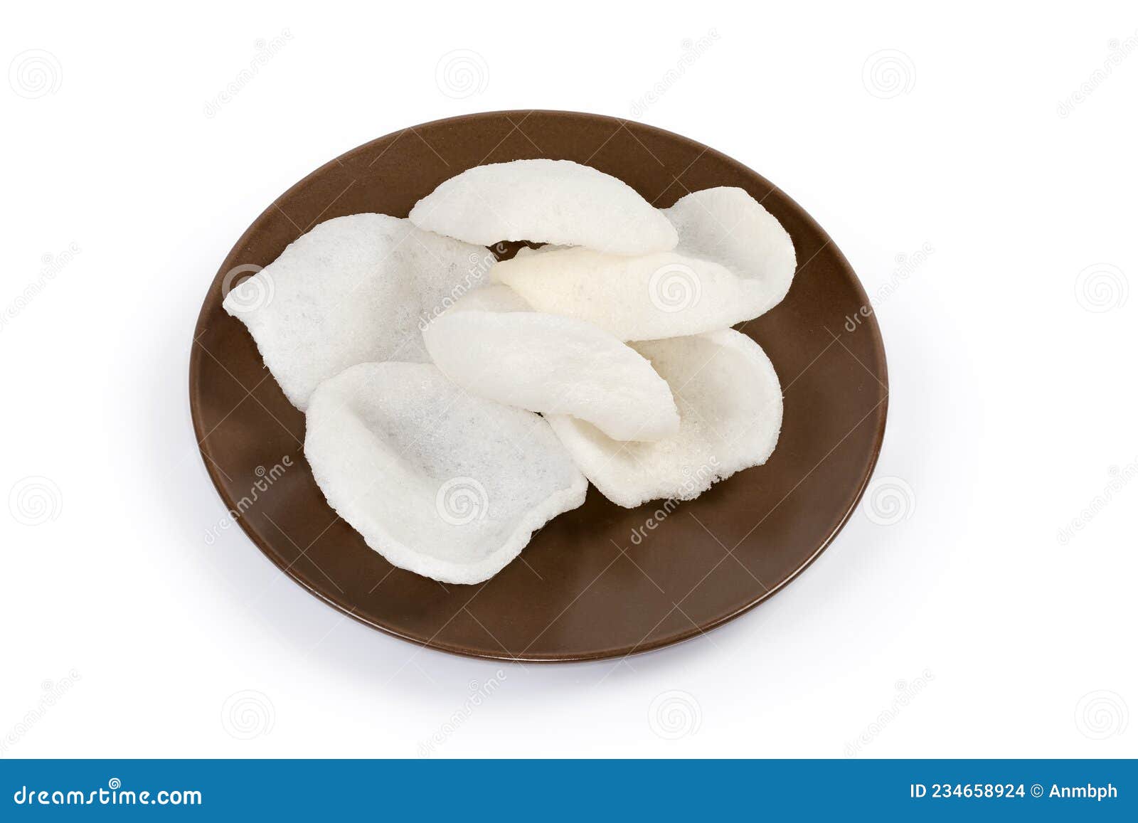 Prepared Rice Chips on Brown Dish on a White Background Stock Photo ...