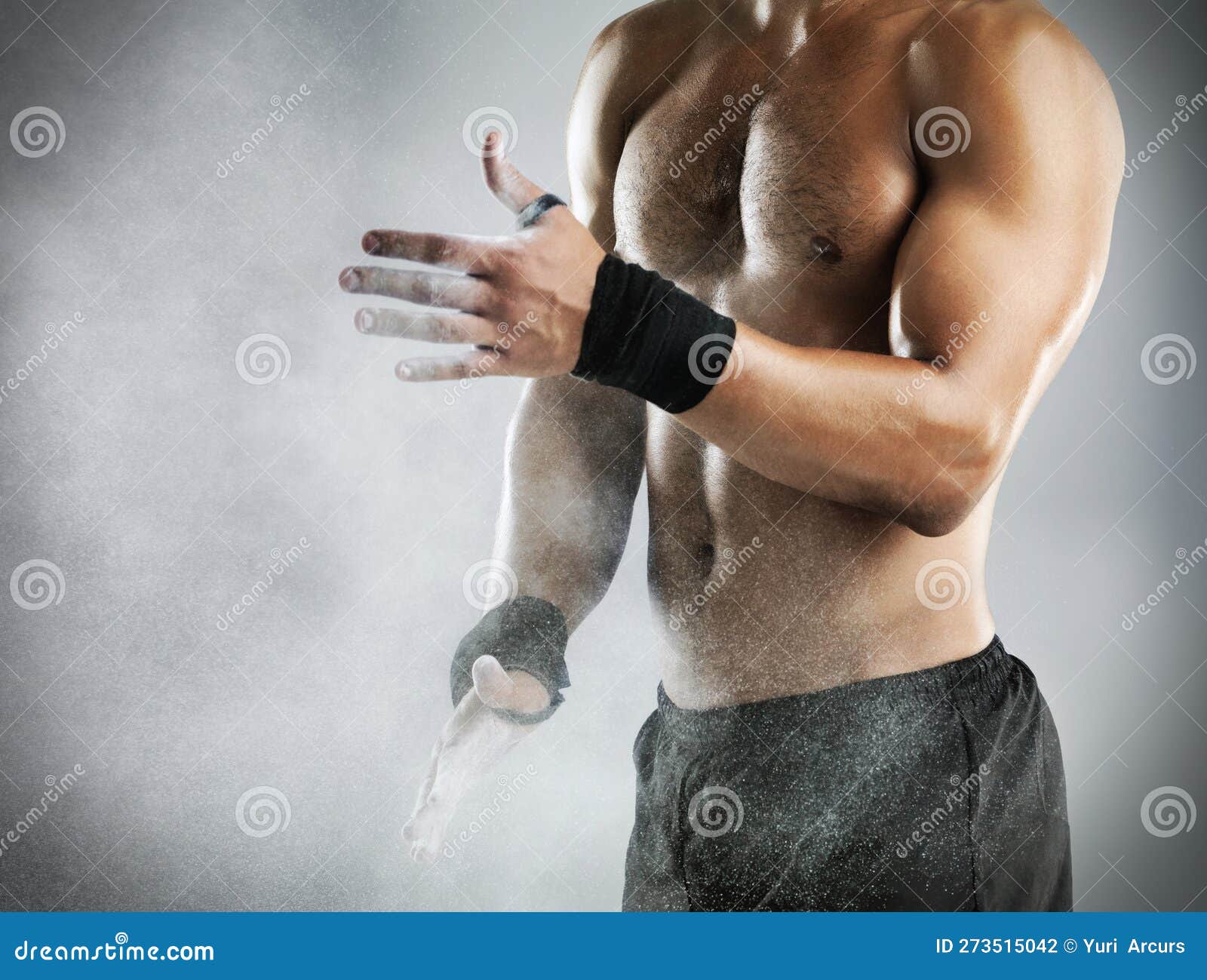 Preparing for Action. Cropped Studio Shot of a Man Dusting His Hands ...