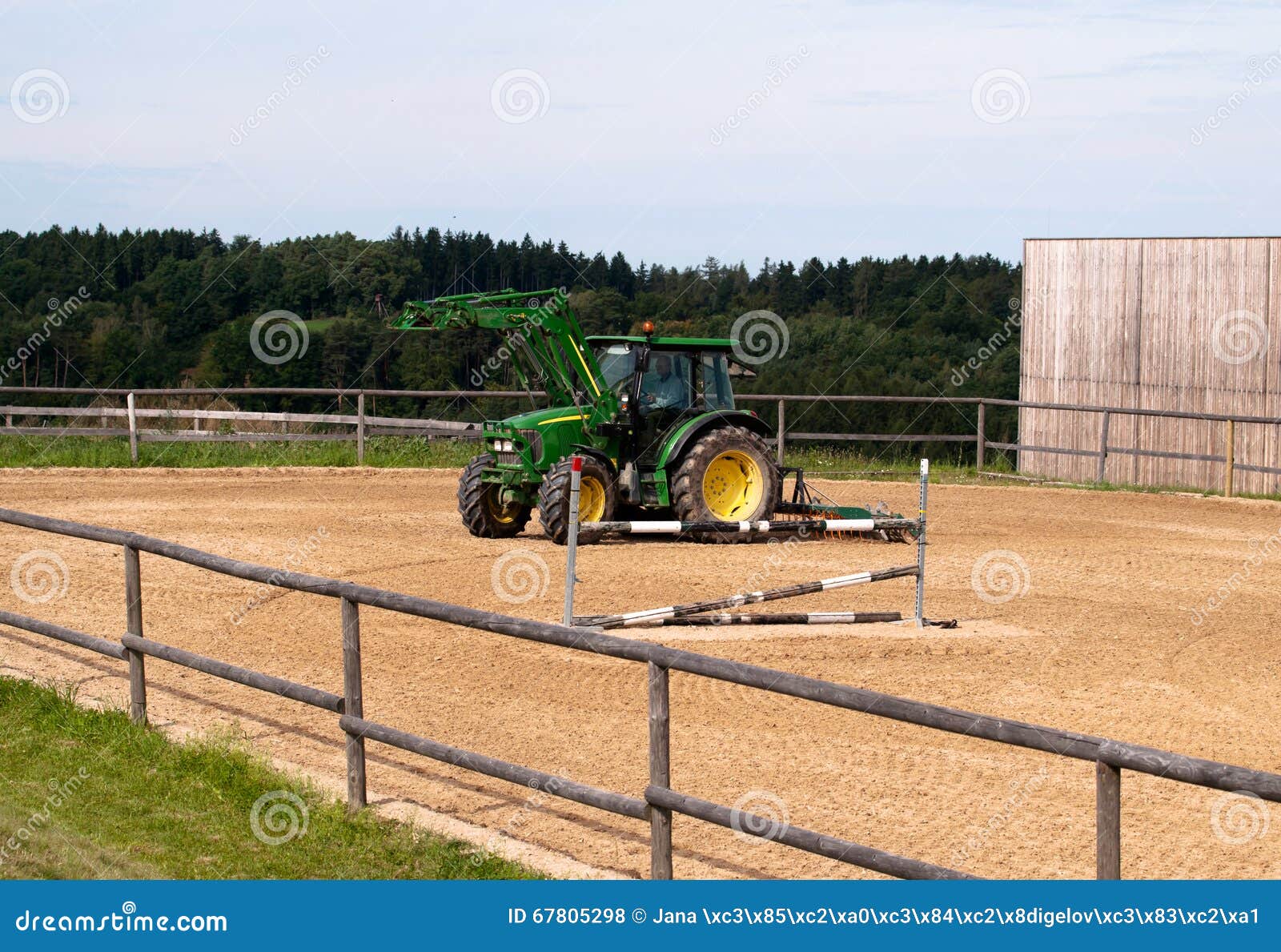 Preparing Arena for Showjumping Stock Photo - Image of farm, straighten ...