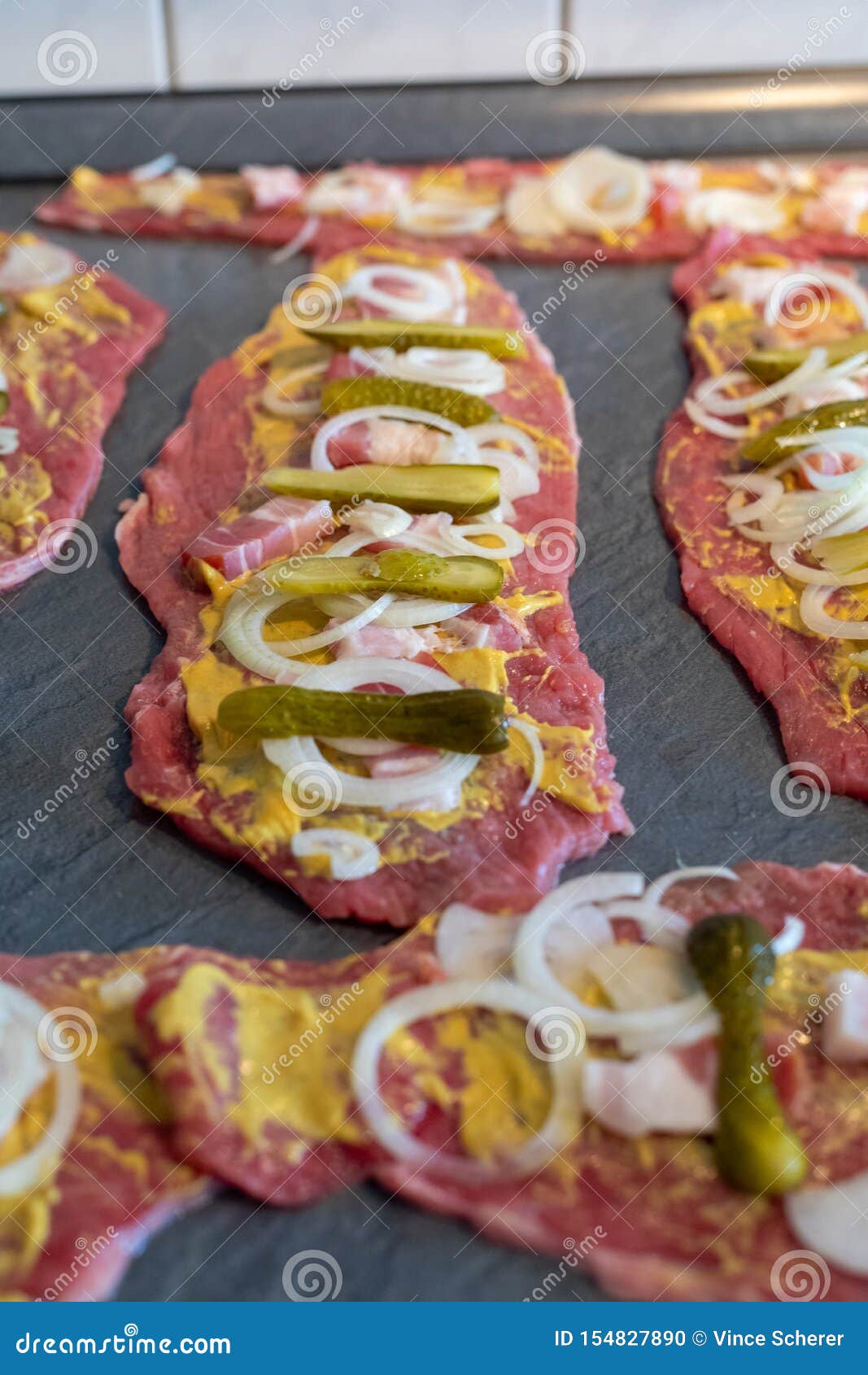 Preparing Beef Rouladen, Fresh Raw Meat Coated with Mustard and Onions ...