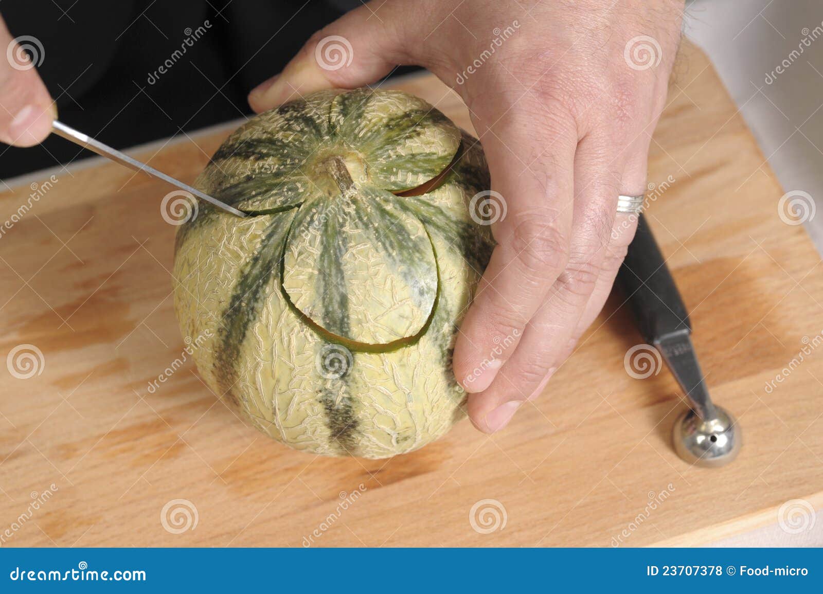 Preparing a carved melon stock photo. Image of ingredient - 23707378