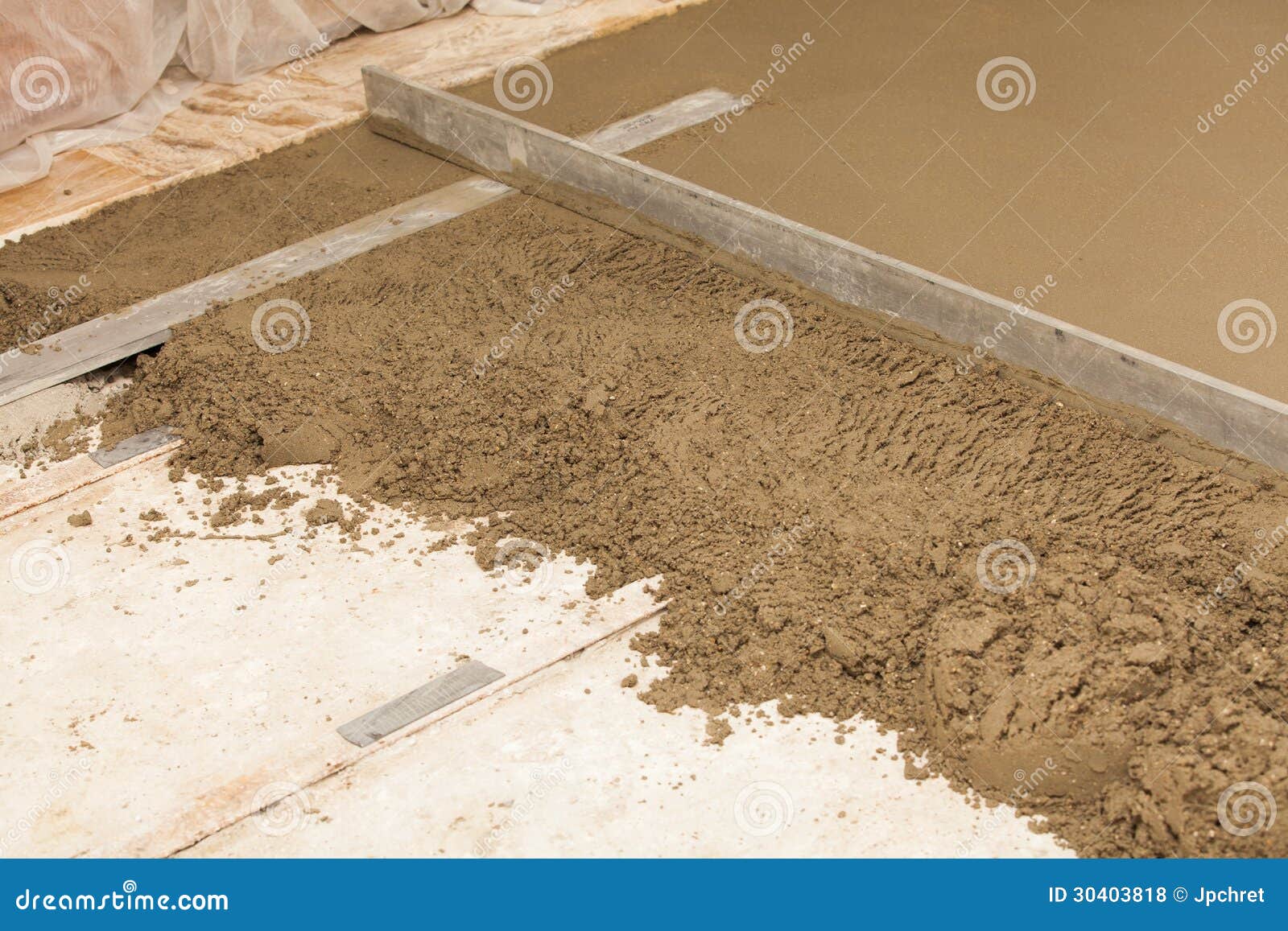 Preparing a cement screed stock photo. Image of floor - 30403818