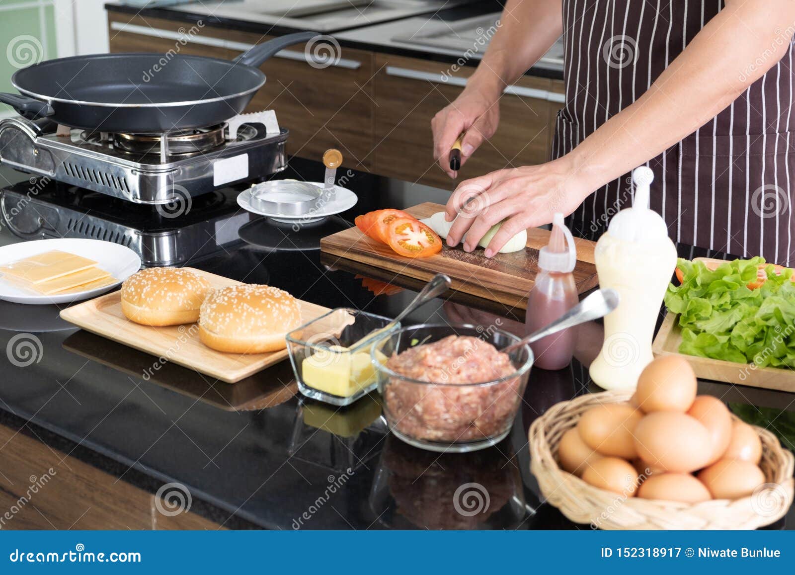 Preparing Delicious Burger in Kitchen at Home Stock Image - Image of ...