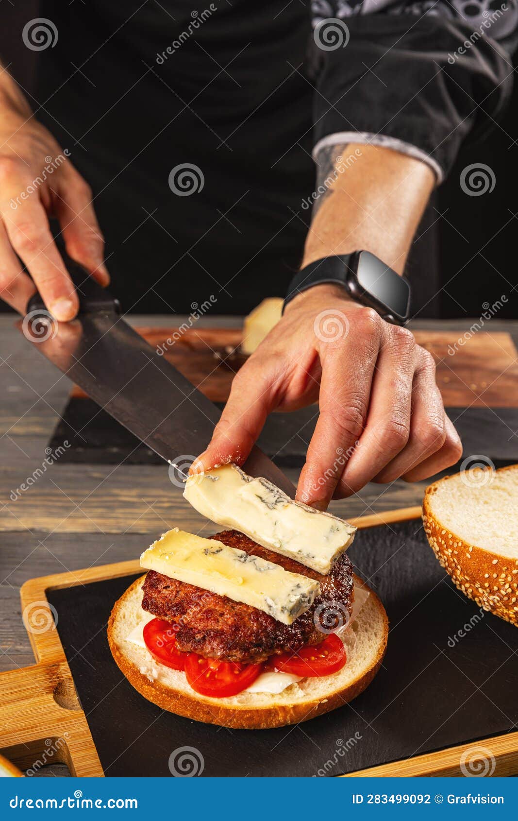 Preparing Delicious Burgers Stock Photo - Image of preparing, hamburger ...