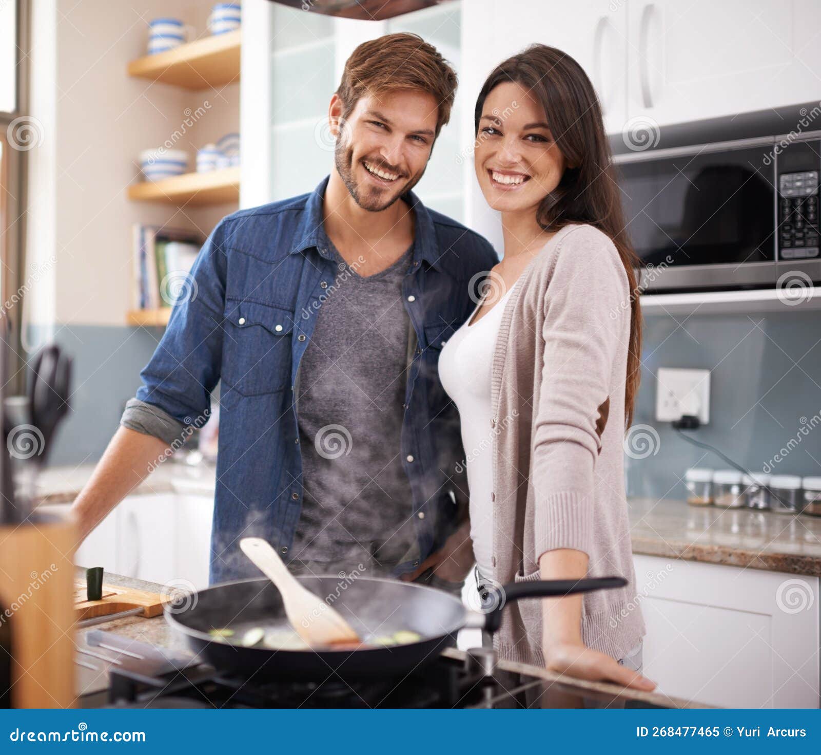 Preparing a Delicious Meal at Home. a Young Couple Making Dinner ...