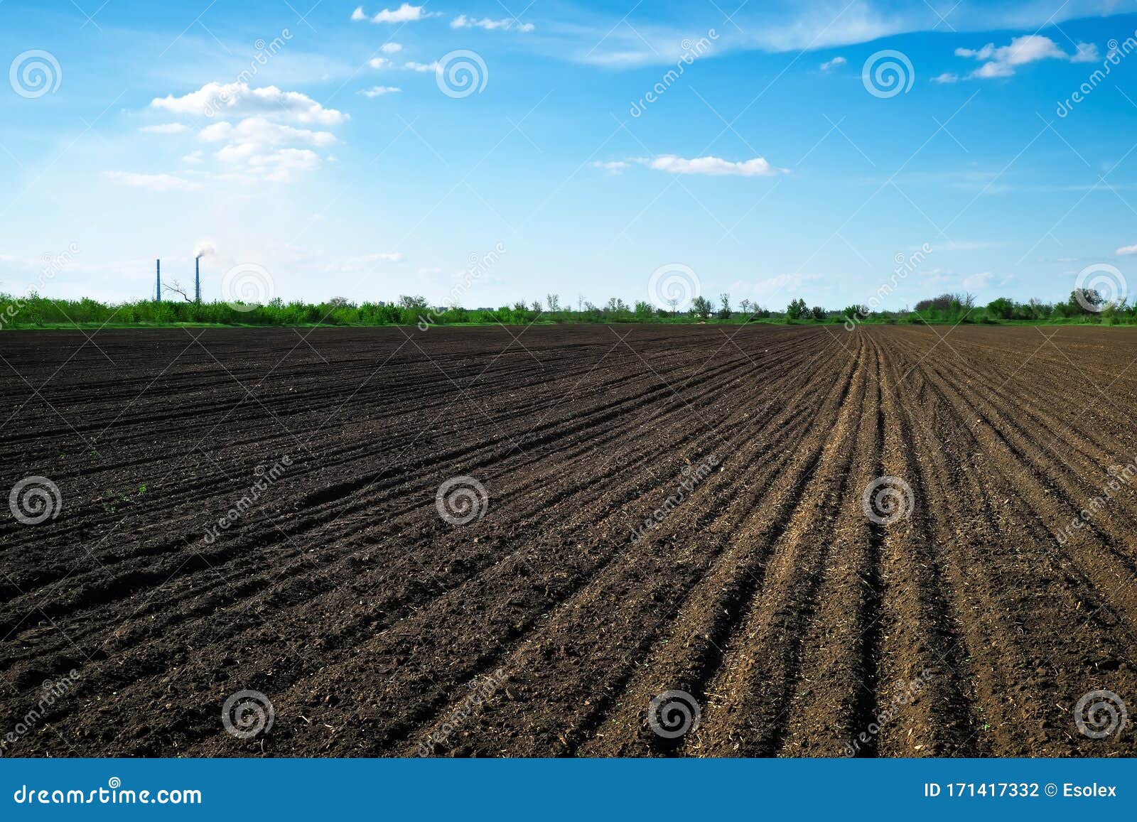 Preparing Field for Planting. Plowed Soil in Spring Time, Two Tubes and ...