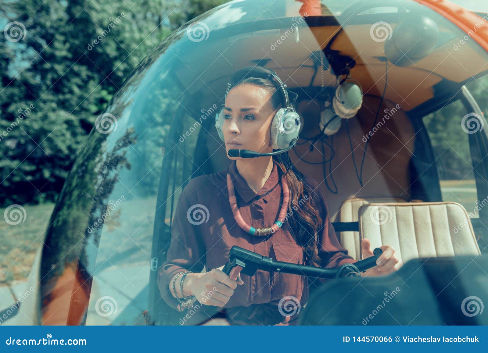 Concentrated Good-looking Female Pilot Wearing Needed Equipment Stock ...