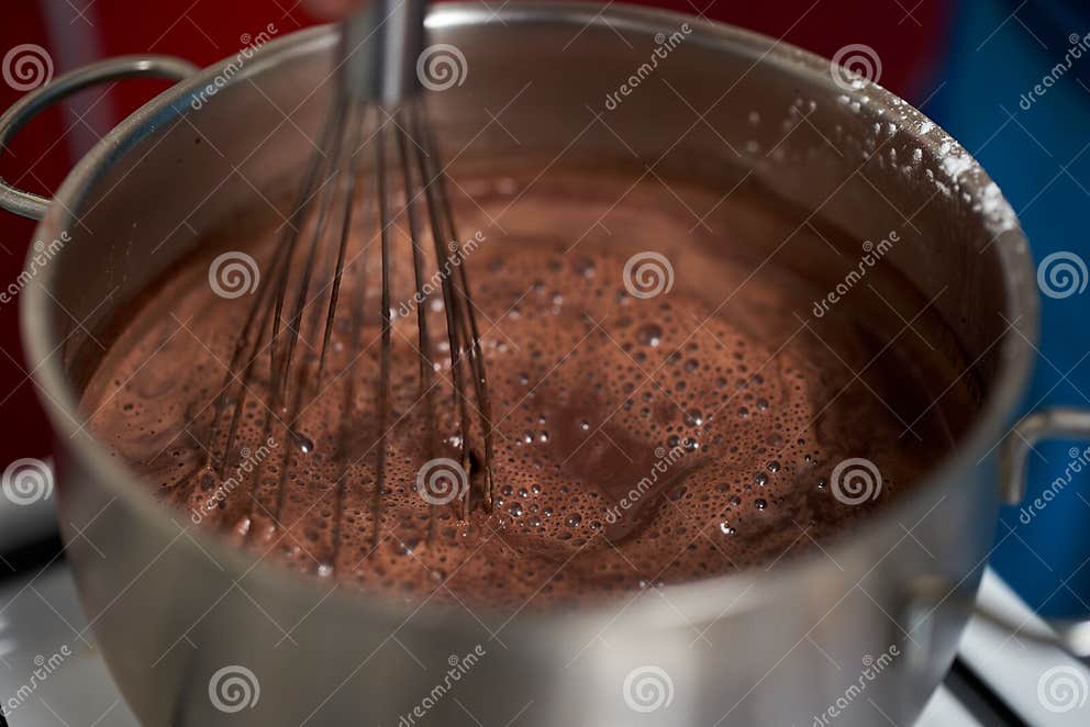 Preparing Homemade Chocolate Pudding, Closeup on Hands Stock Image ...
