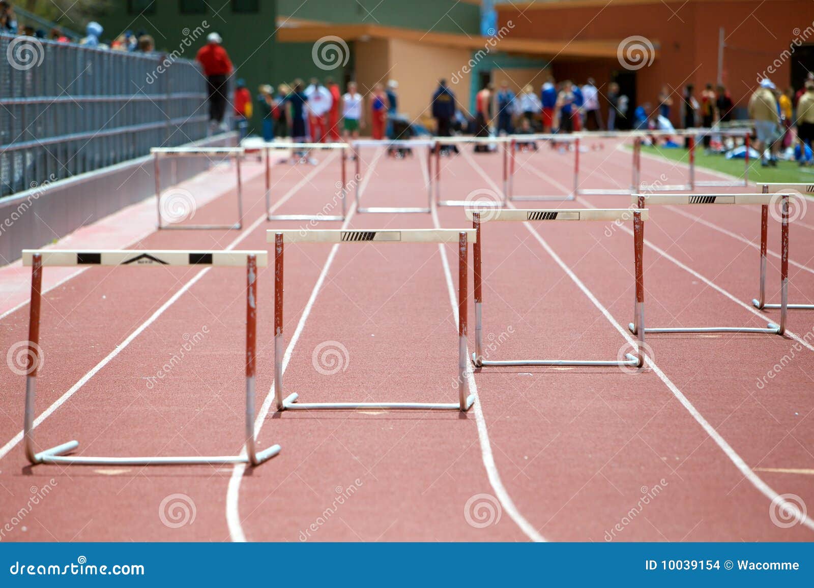 Preparing for a Hurdles Race Stock Photo - Image of athletes, school ...