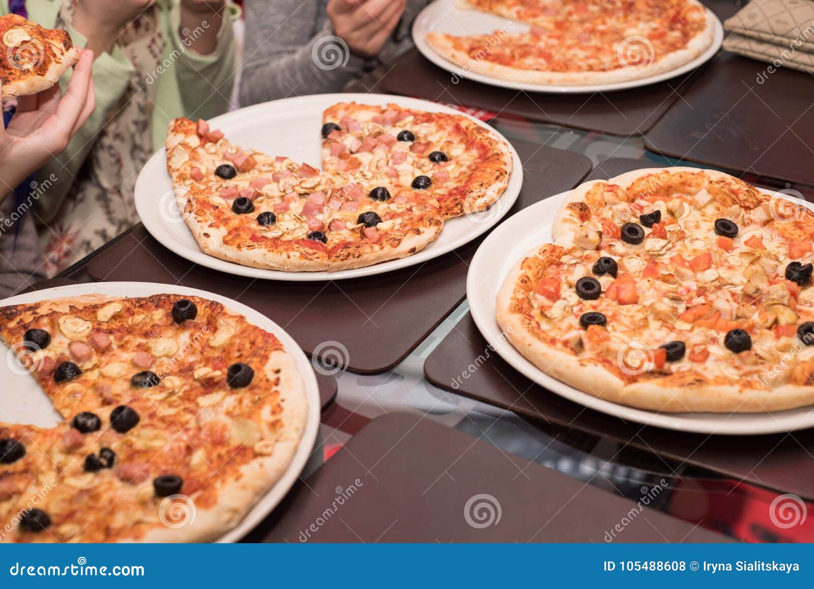 Preparing Individual Pizzas from Pizza Bar. Many Different Pizzas Stock ...
