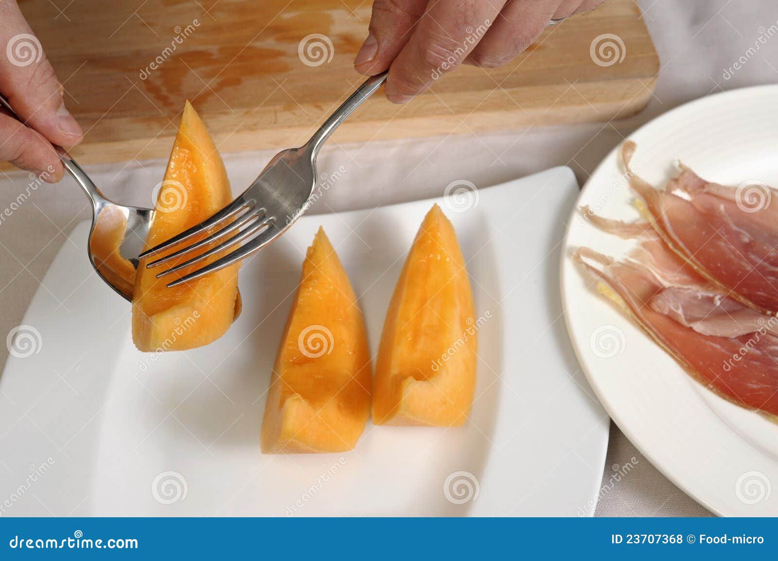 Preparing an Italian-style Melon Stock Photo - Image of slice ...