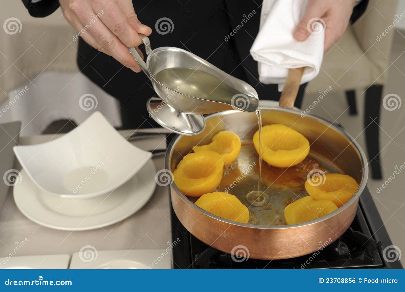 Preparing peaches flamb stock photo. Image of work, warmer - 23708856