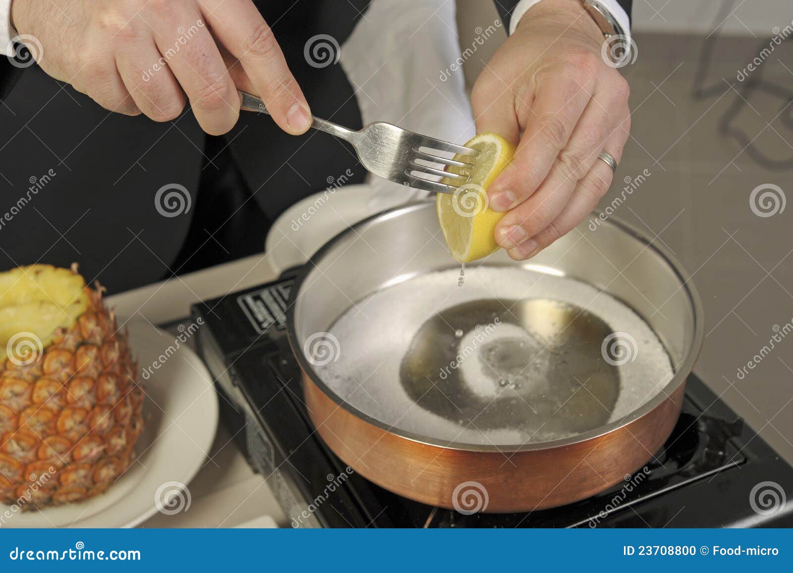 Preparing a Pineapple Flamb Stock Photo - Image of exotic, hand: 23708800