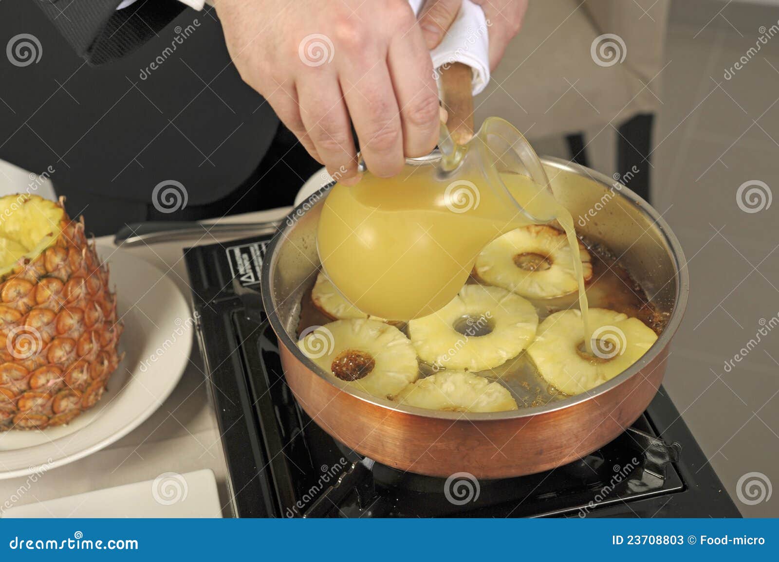 Preparing a Pineapple Flamb Stock Image - Image of indoors, plate: 23708803