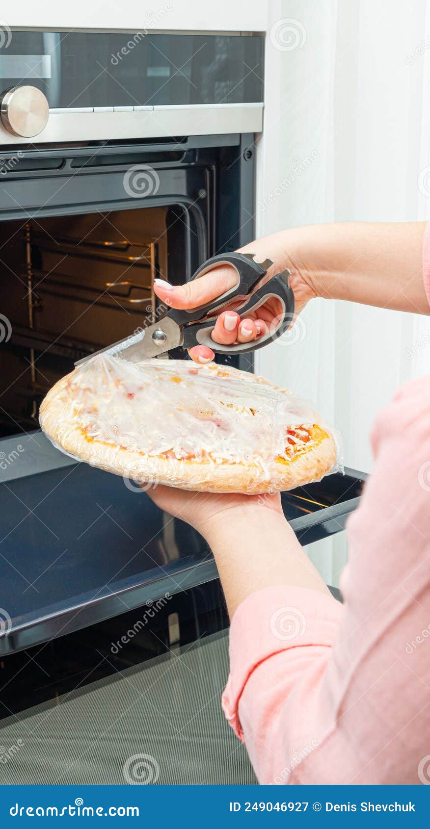Preparing Pizza before Placing it in the Oven, Opening the Package ...