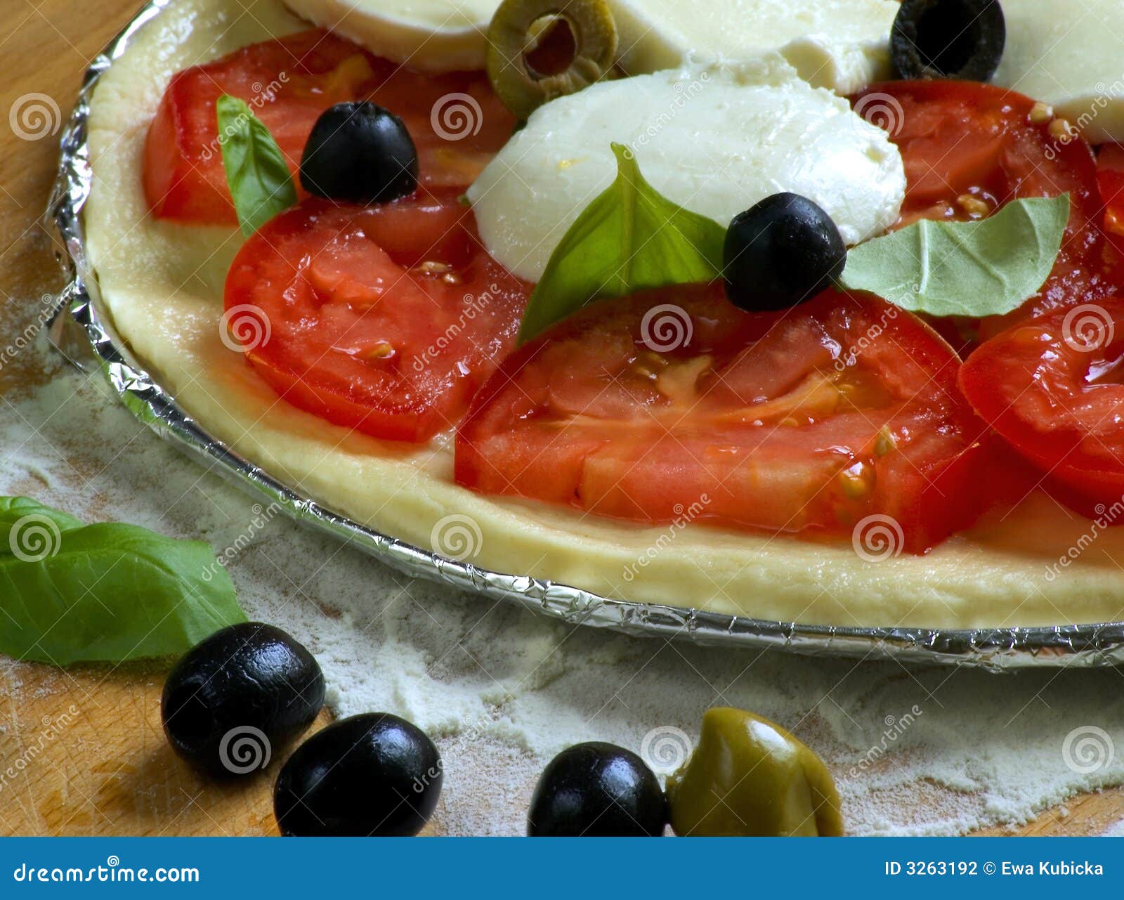 Preparing pizza step two stock photo. Image of ingredient - 3263192