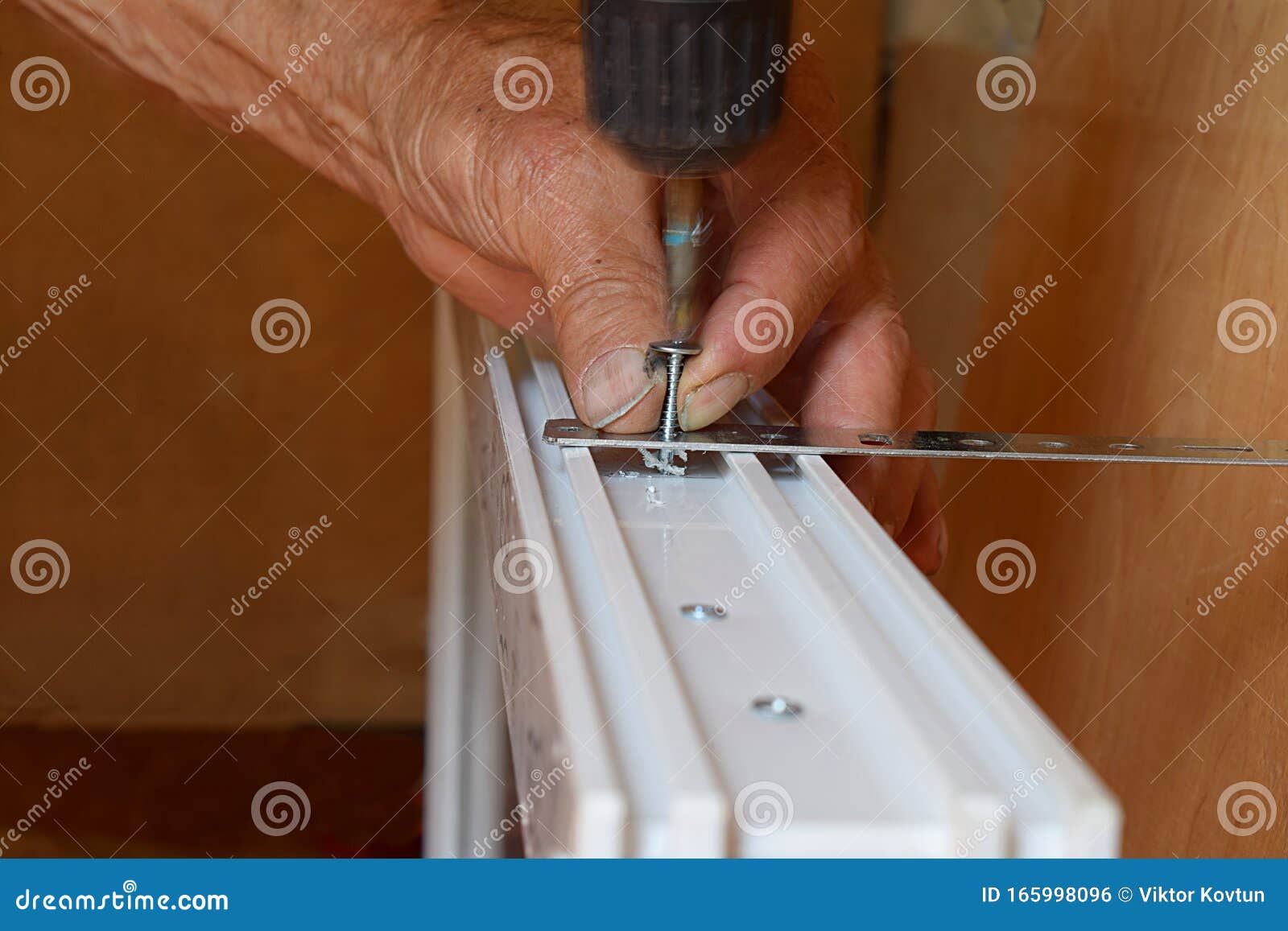 Preparing a Plastic Window for Installation in a Window Opening Stock ...