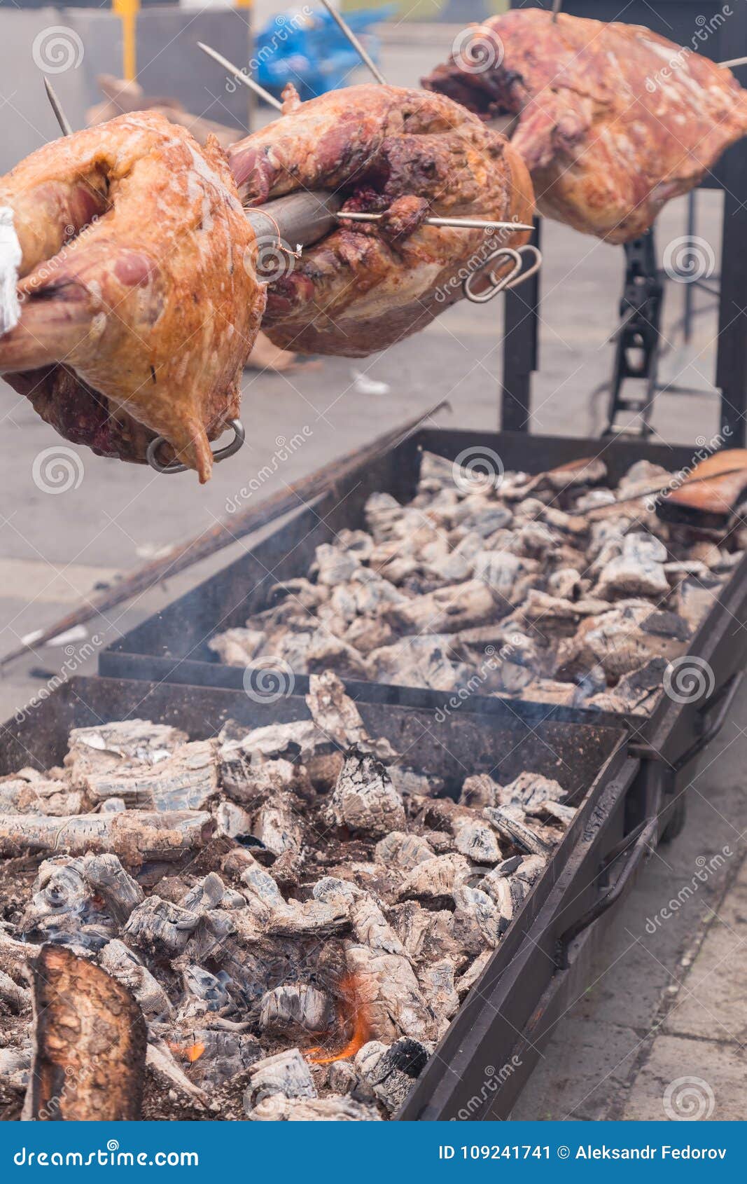 Preparing a ram on a spit stock image. Image of baked - 109241741