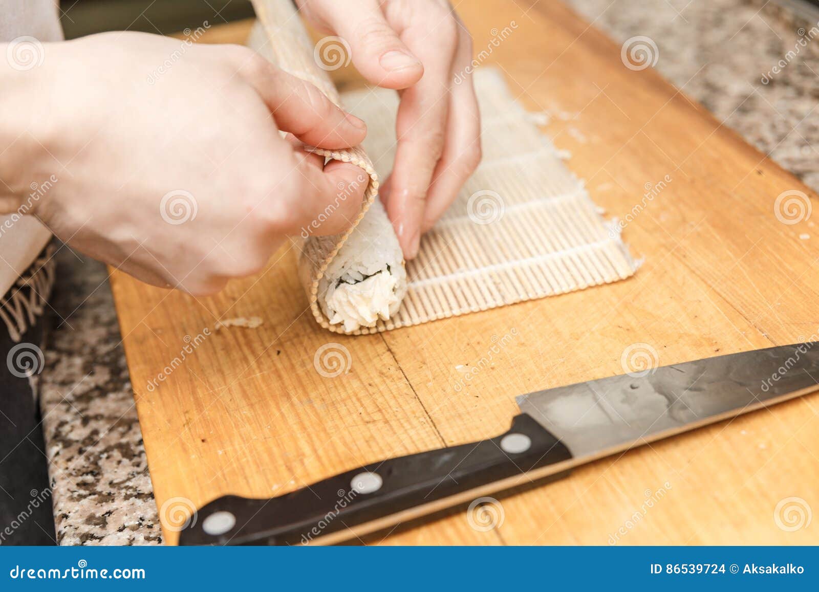 Preparing, rolling sushi. stock photo. Image of makisu - 86539724
