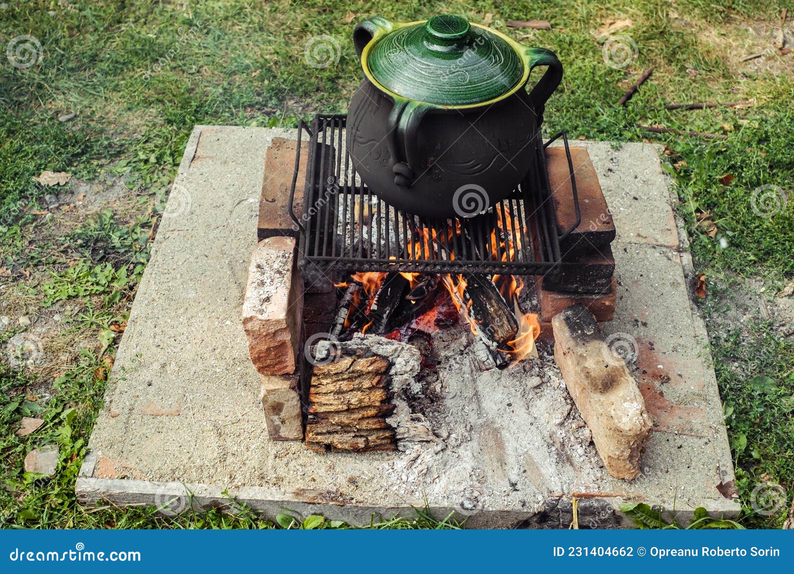 Preparing A Romanian Traditional Grill With Bright Flame On A Wild Area ...