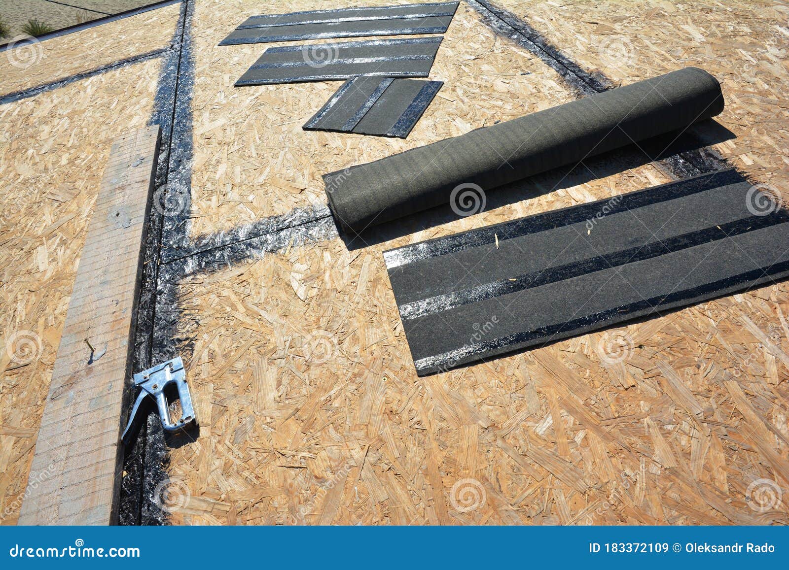 Preparing a Roof Deck and Working Tool Stapler, Having the Surface of ...