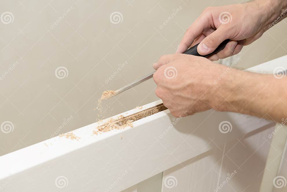 Preparing a Seat for Door Lock Using a Chisel Stock Image - Image of ...