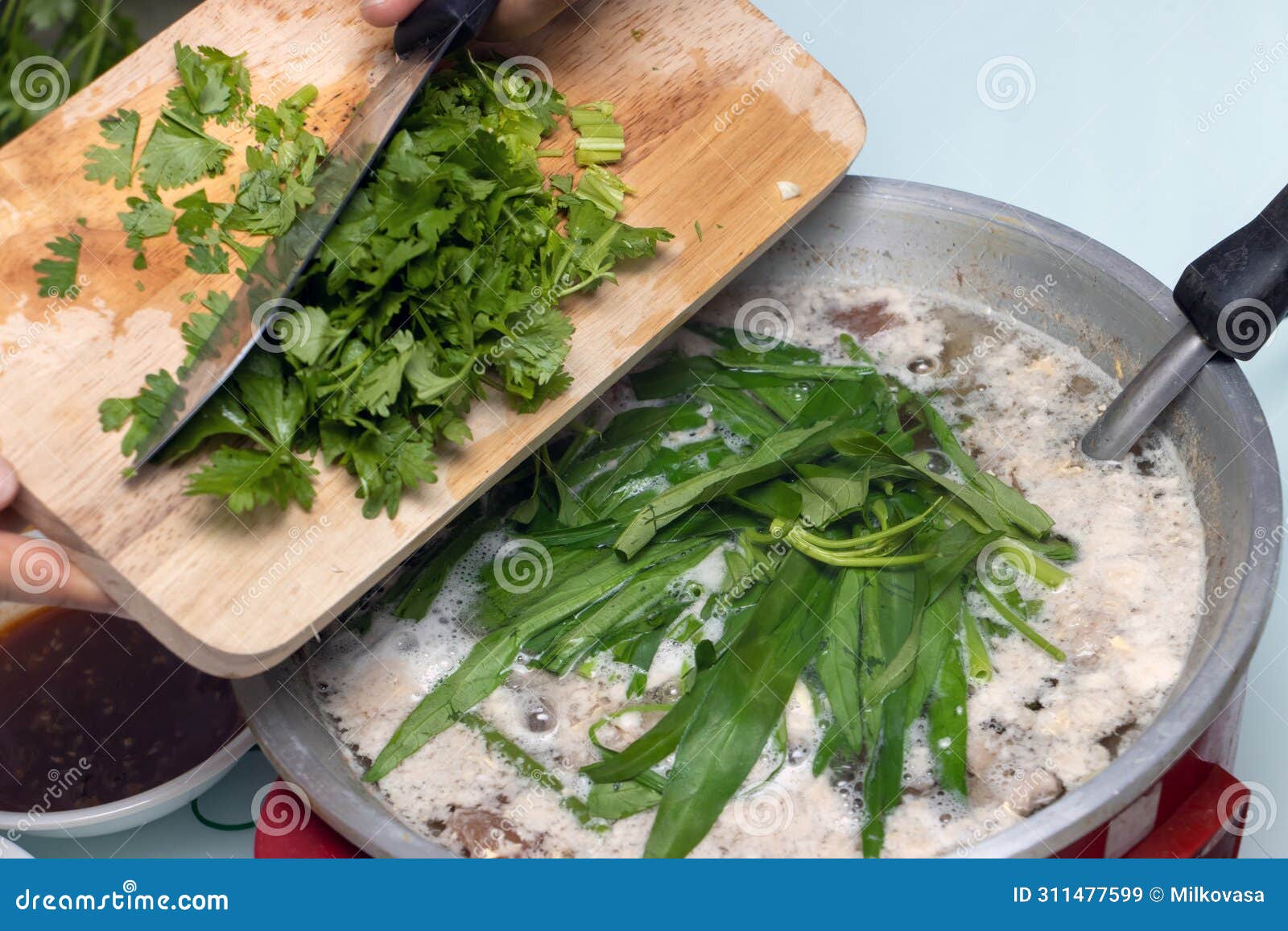 Preparing Traditional Suki Soup by Cooking in a Pot Stock Image - Image ...