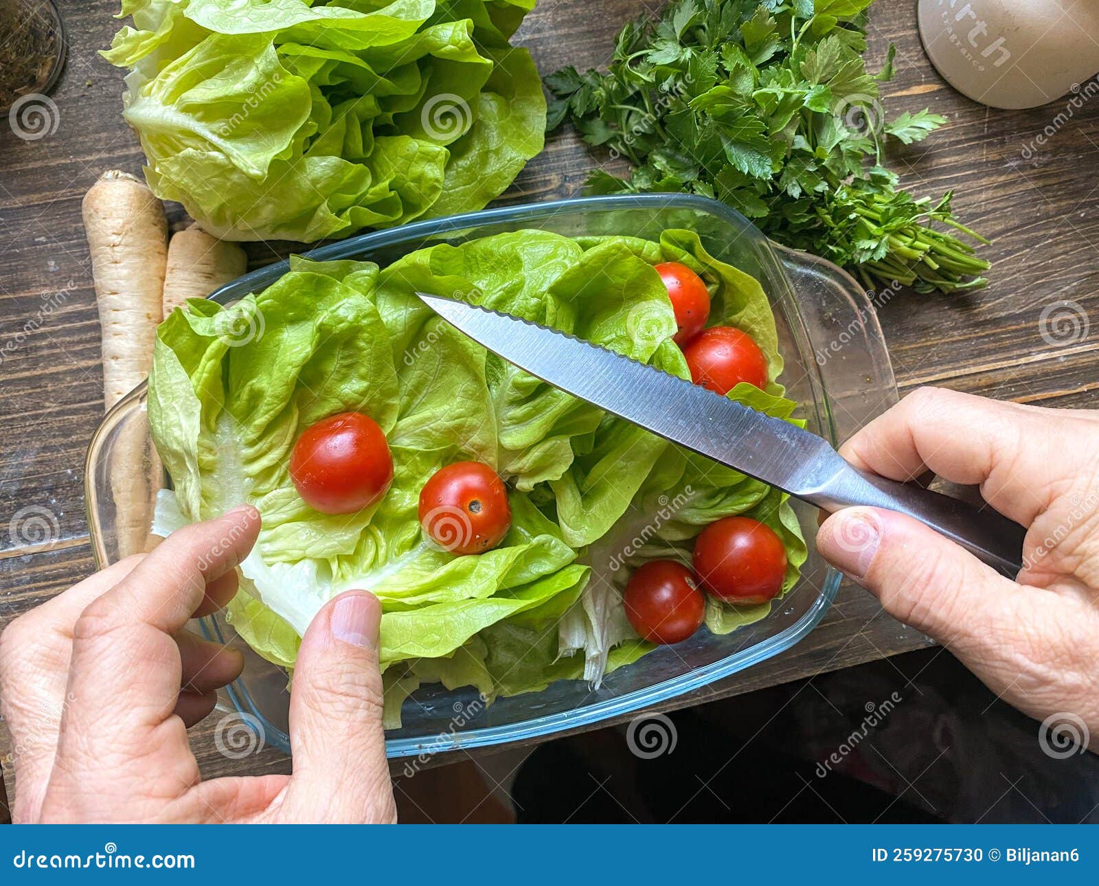 Preparing vegetable salad stock photo. Image of knife - 259275730
