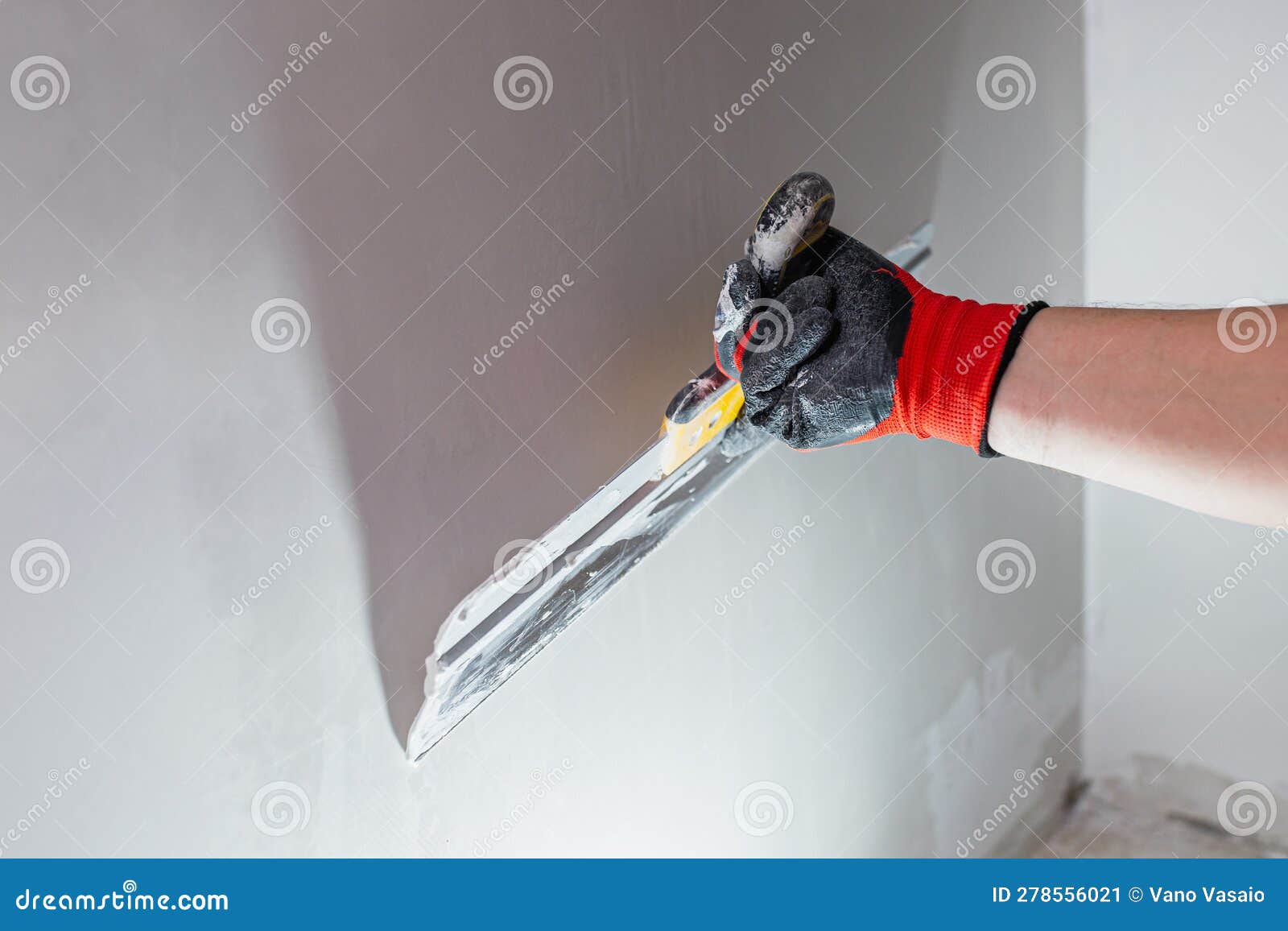 Leveling the Walls with White Putty Stock Image - Image of craftsman ...