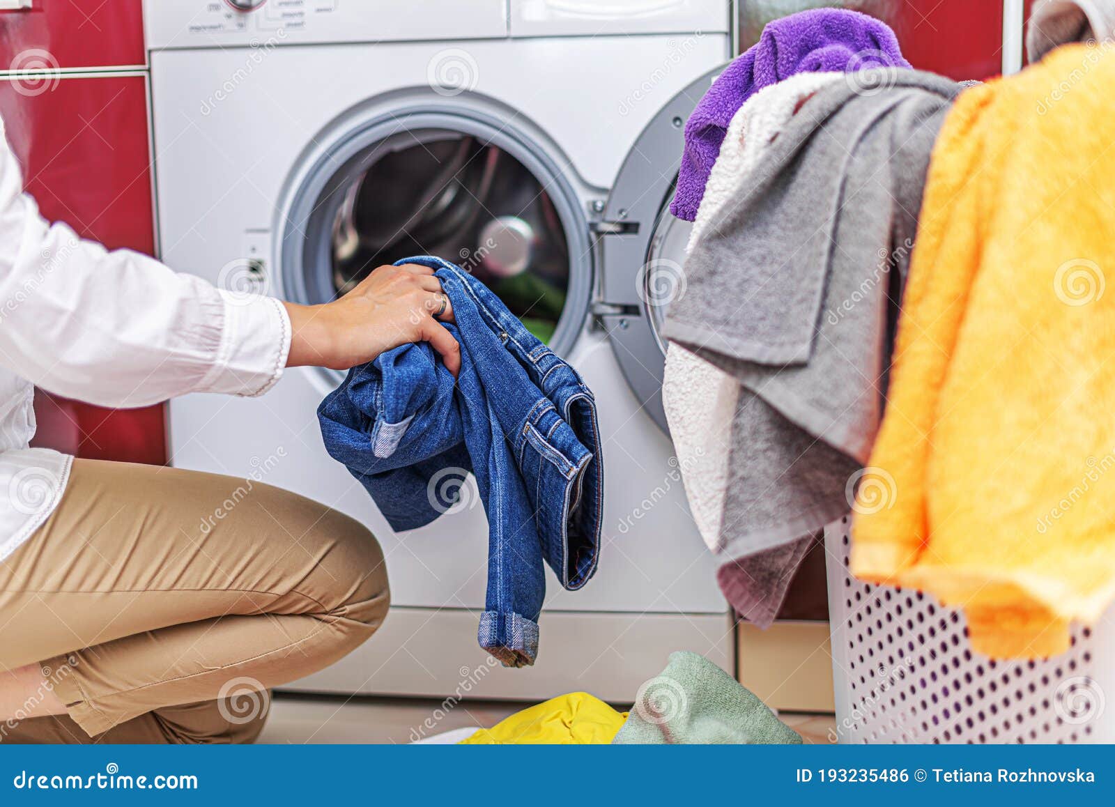 Preparing the wash cycle. stock photo. Image of laundry - 193235486