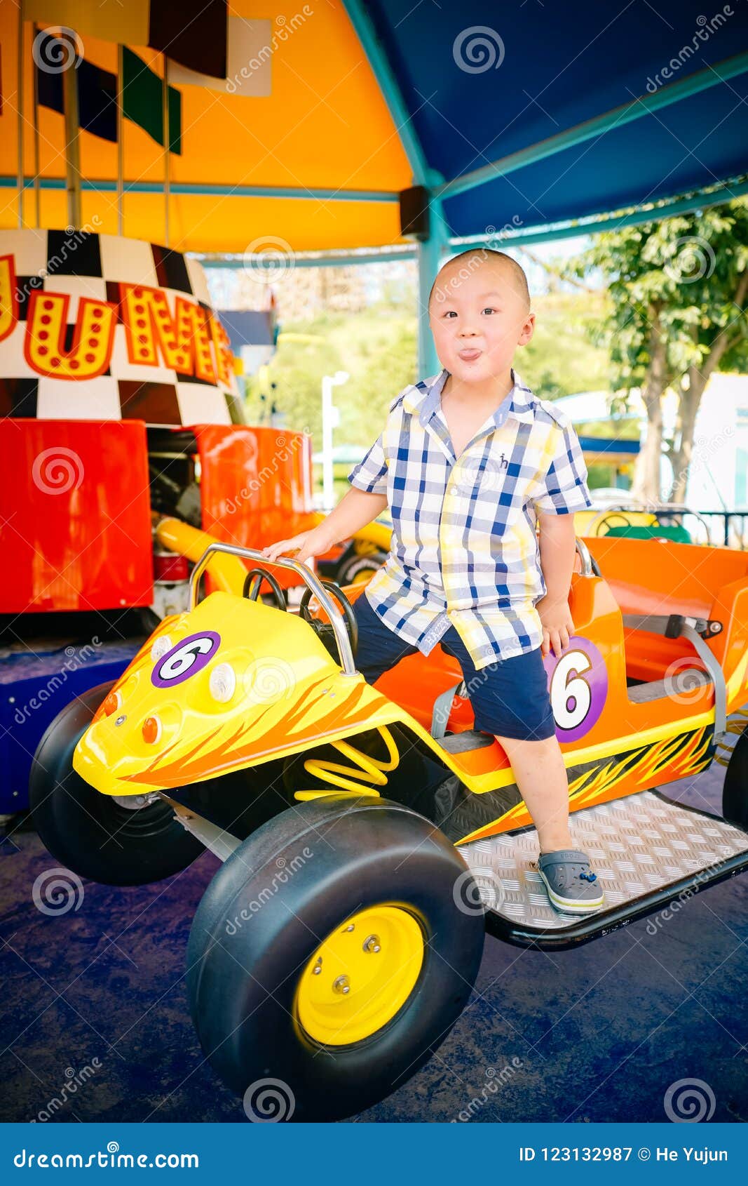 Boy Driving Car in Amusemant Park Stock Image - Image of blond, drive ...