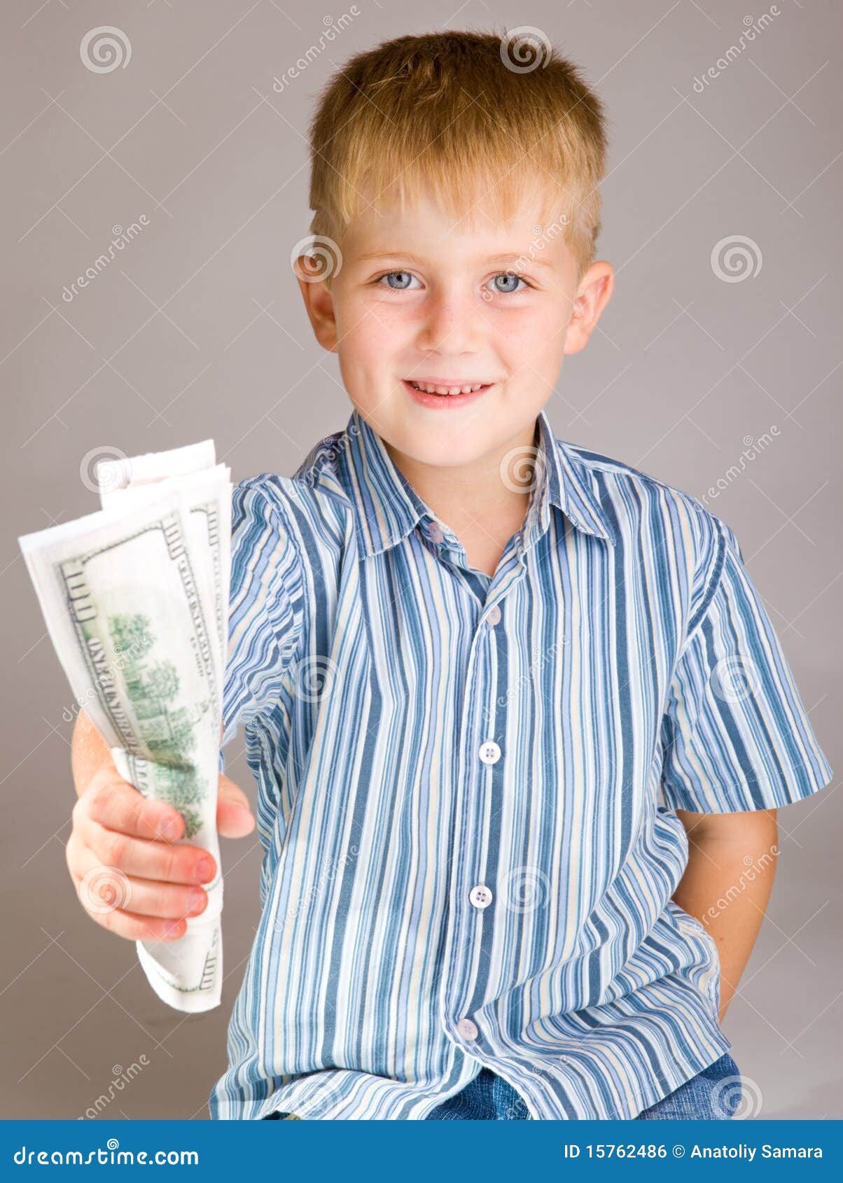 Preschool boy giving money stock photo. Image of joyful - 15762486