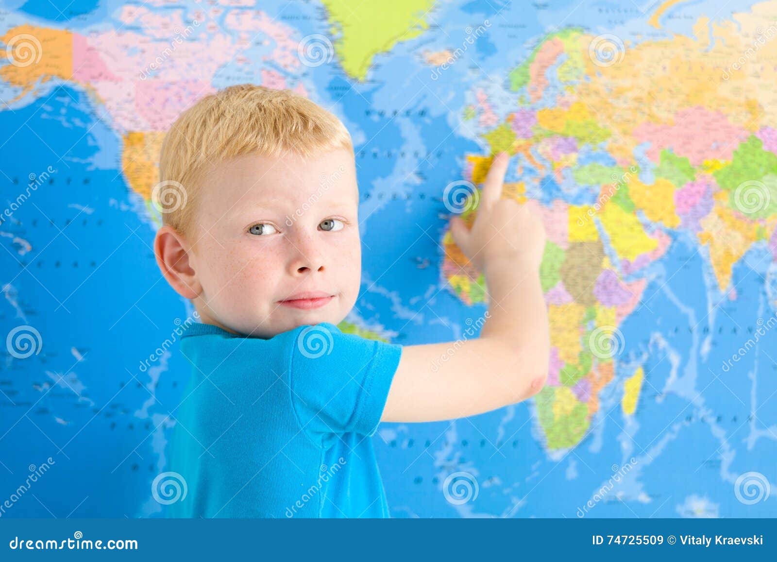 Preschool Boy With World Map Stock Photo | CartoonDealer.com #74725284