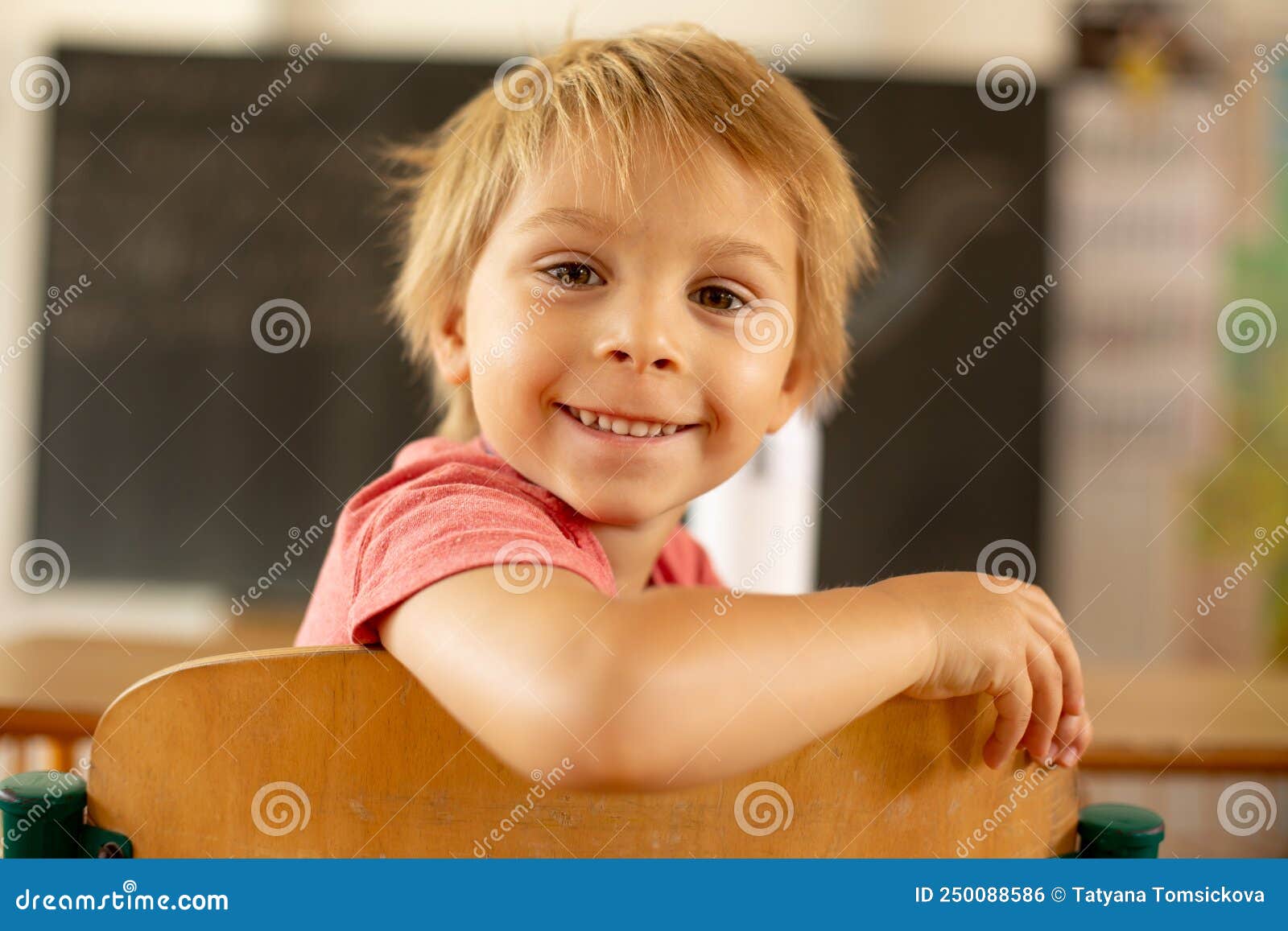 Preschool Child, Sitting on a Desk at School, Having Lesson, Learning ...