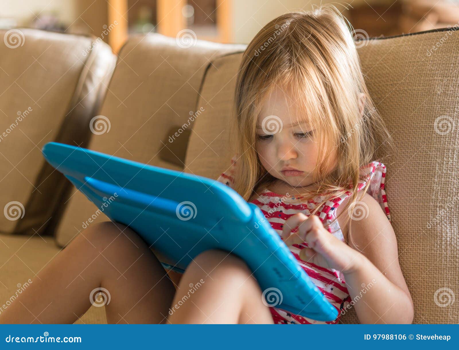 Preschool Girl Using a Tablet Computer at Home Stock Photo - Image of ...