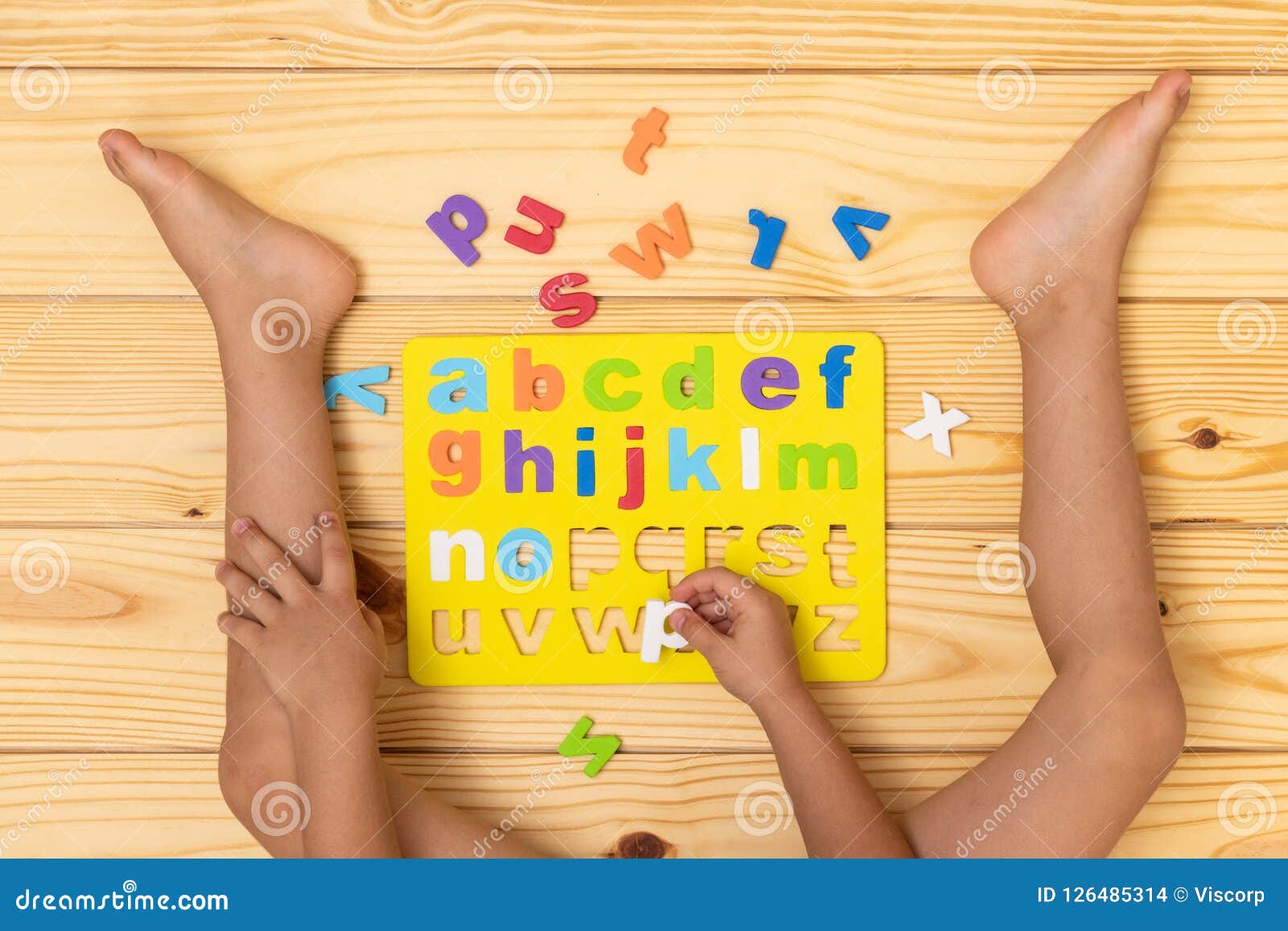 Kid Learning the Alphabet stock photo. Image of kids - 126485314