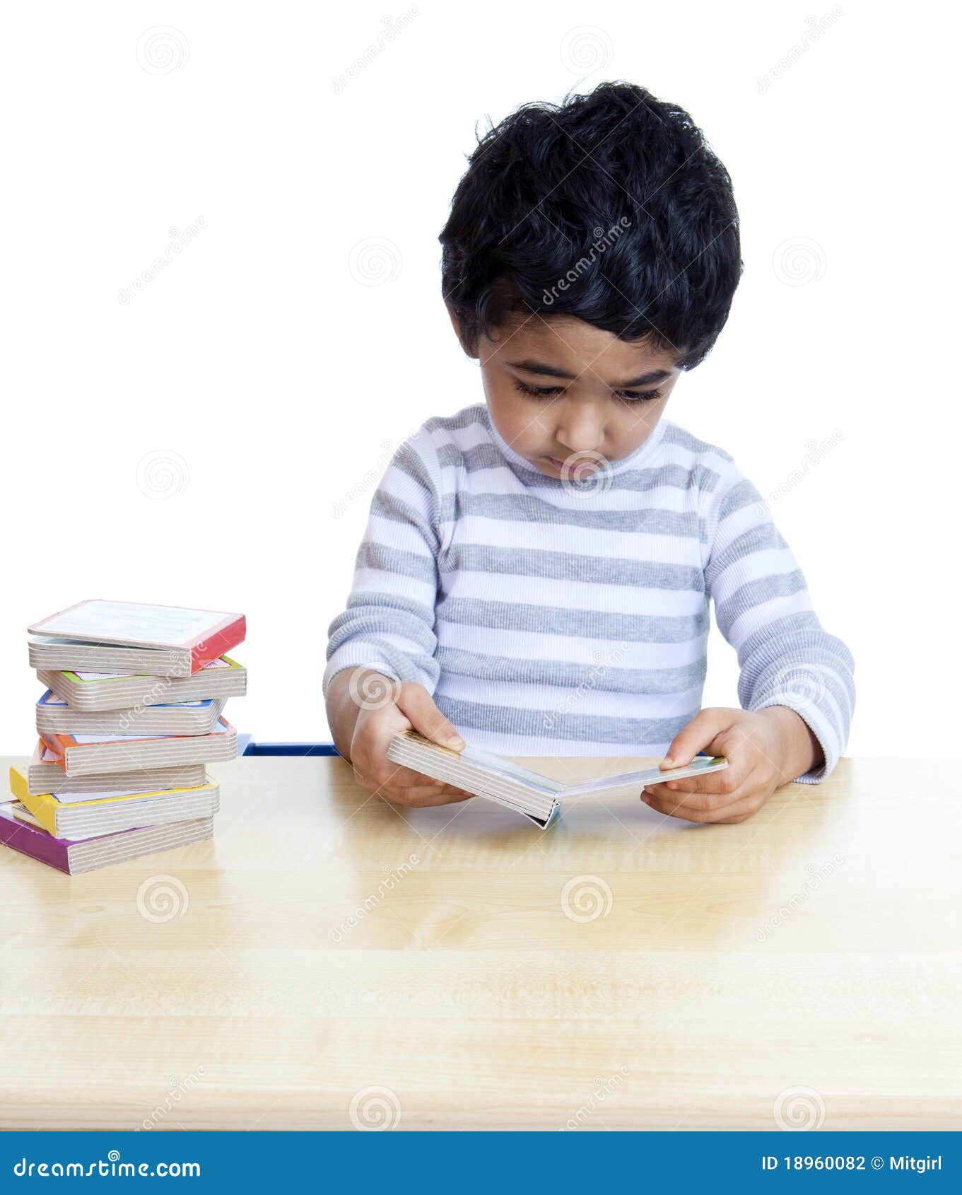 Preschooler Engrossed in Reading Picture Books Stock Photo - Image of ...
