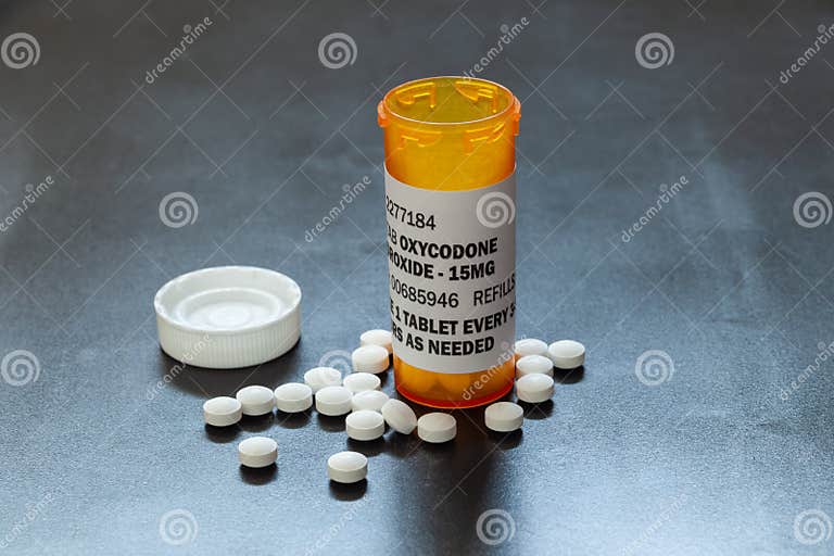 Prescription Bottle with Backlit Oxycodone Tablets. Oxycodone is a ...