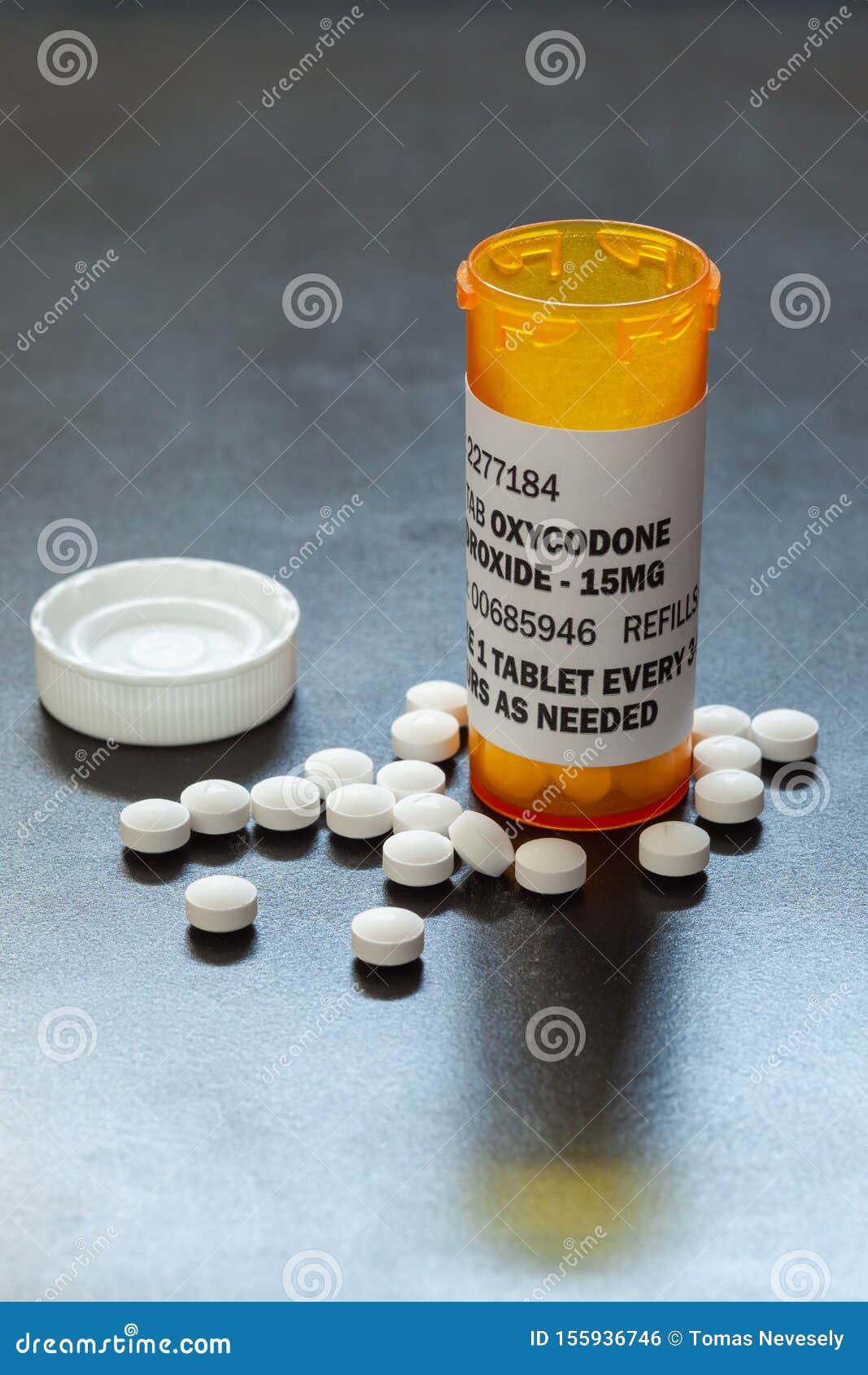 Prescription Bottle with Backlit Oxycodone Tablets. Oxycodone is a ...
