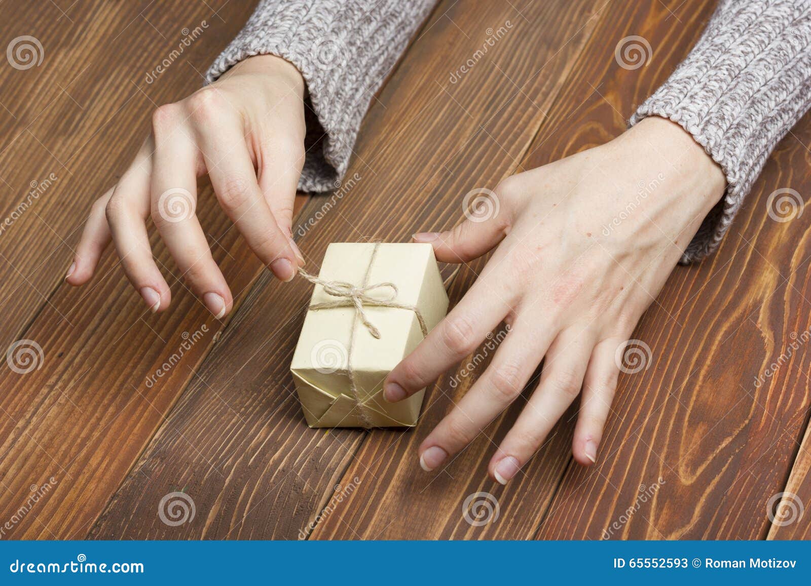 Present, Gift. Close Up of Female Hands Holding Small Gift Stock Image ...