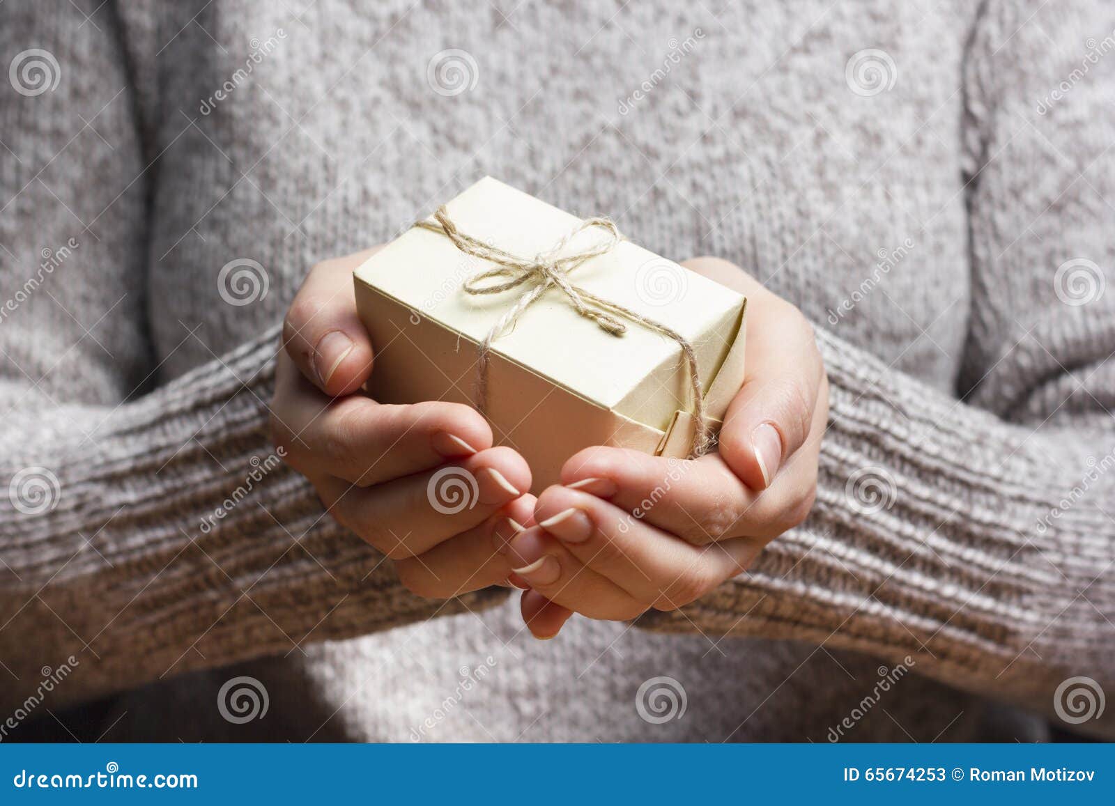 Present, Gift. Close Up of Female Hands Holding Small Gift Stock Image ... Present, Gift. Close Up of Female Hands Holding Small Gift Stock Image ...
