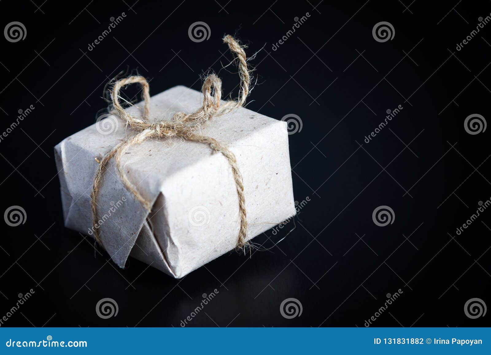 Present Wrapped in Plain Brown Paper and Tied with String Stock Photo ...