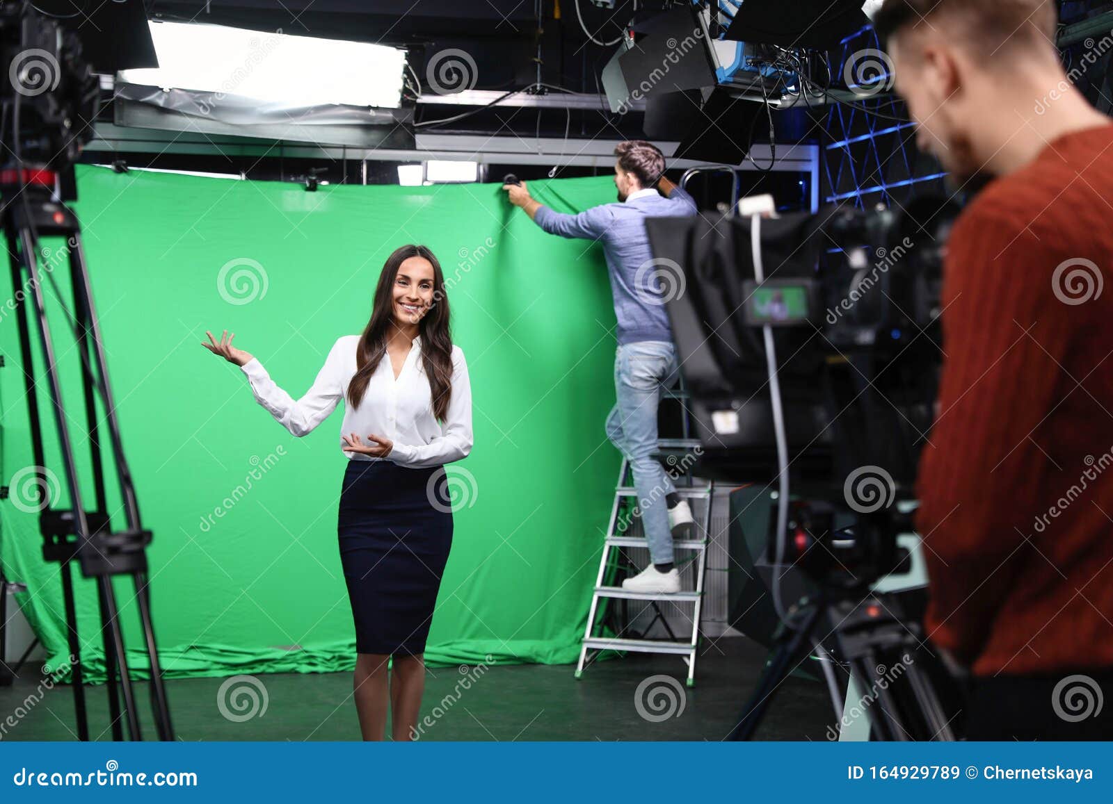 Presenter, Technician and Video Camera Operator Working. News ...