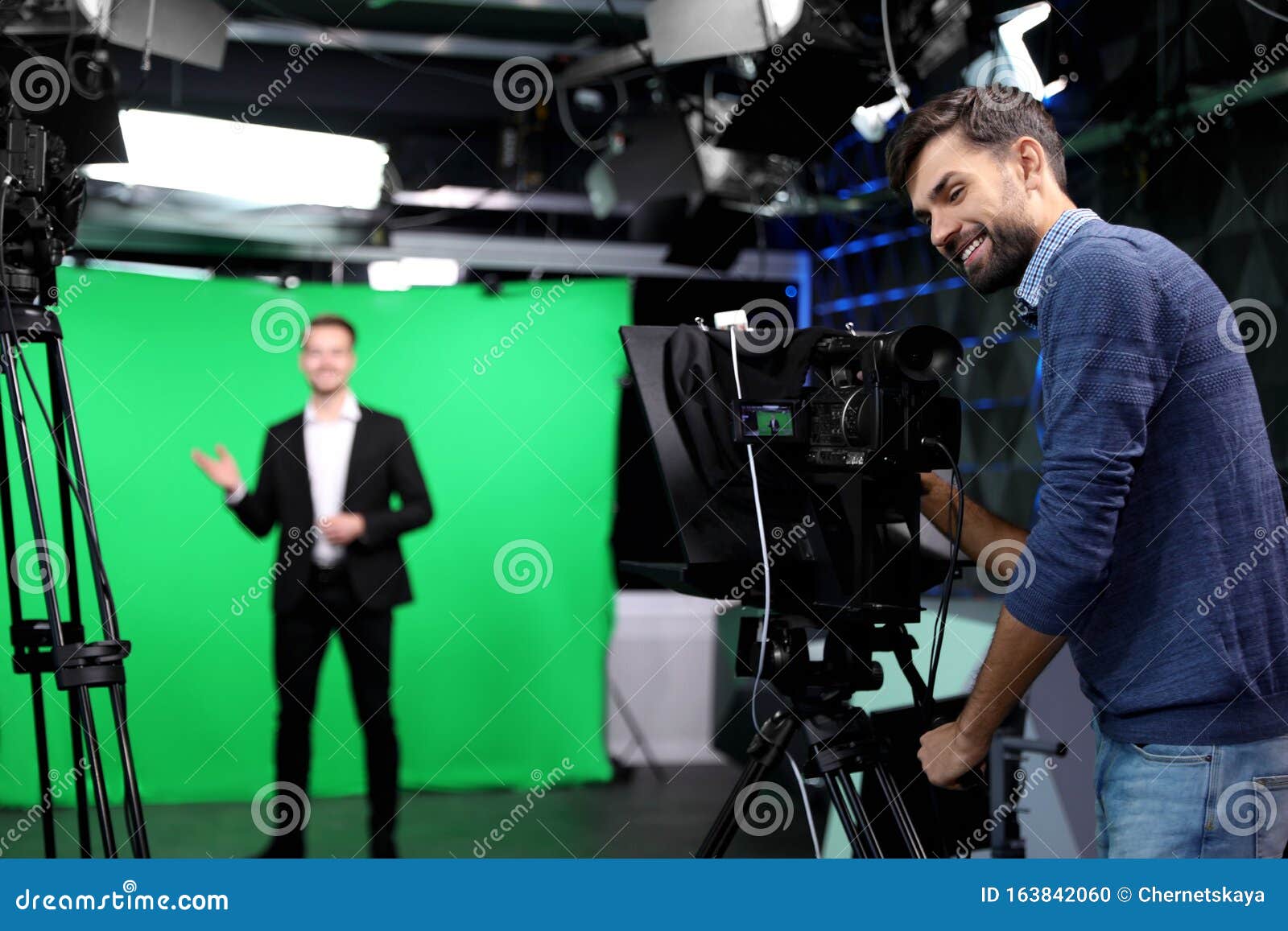 Presenter and Video Camera Operator Working. News Broadcasting Stock ...