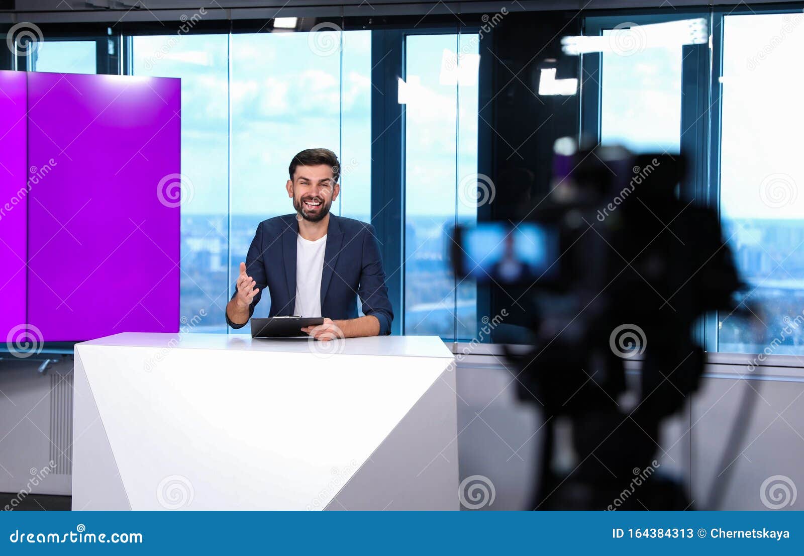 Presenter and Video Camera Operator Working. News Broadcasting Stock ...